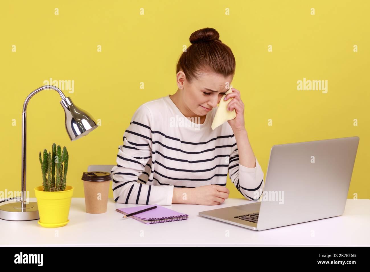 Depressed overworked woman office manager crying and wiping tears with ...