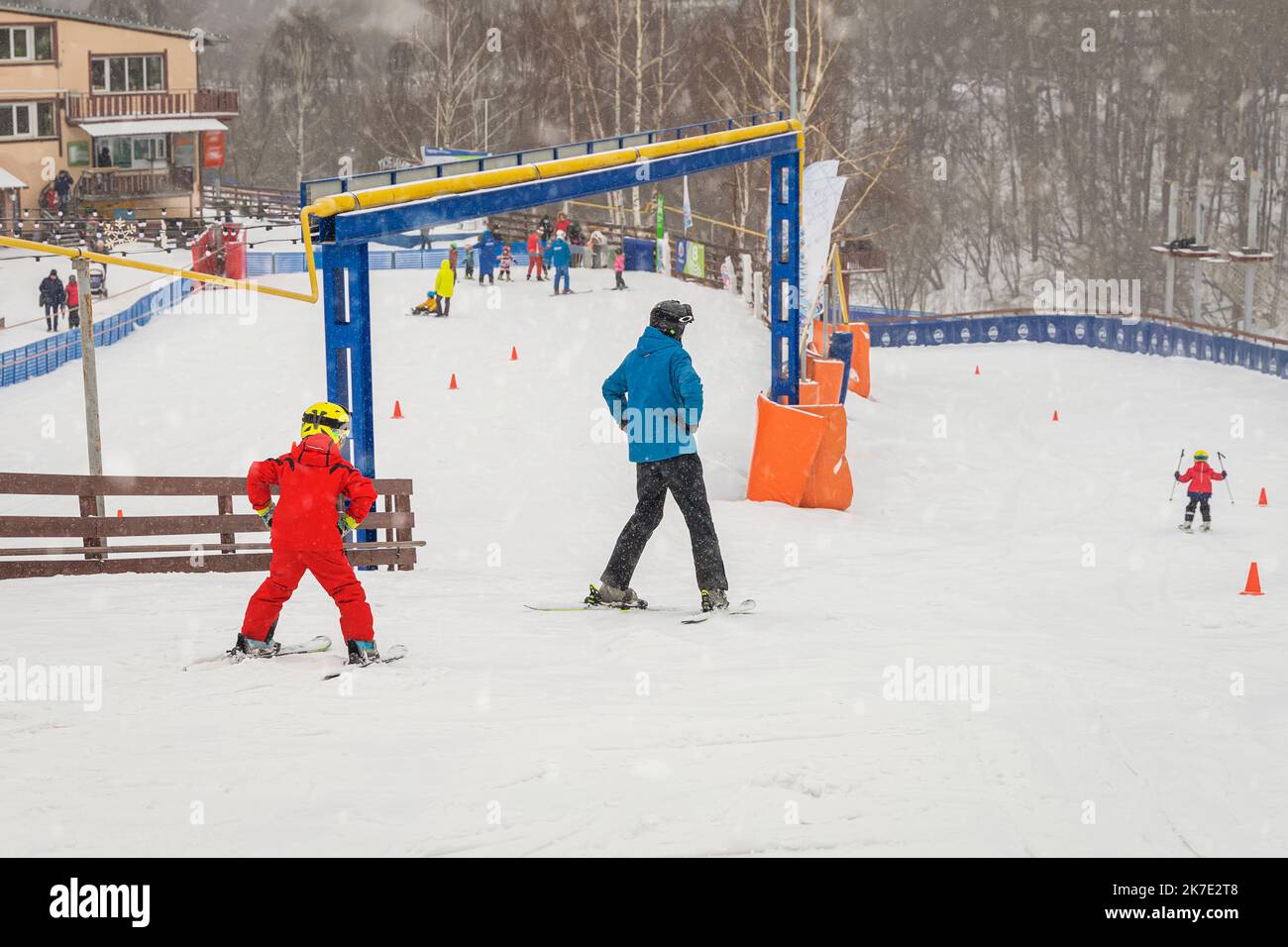 Ski slope, training slide, ski training, instructor and child student ...