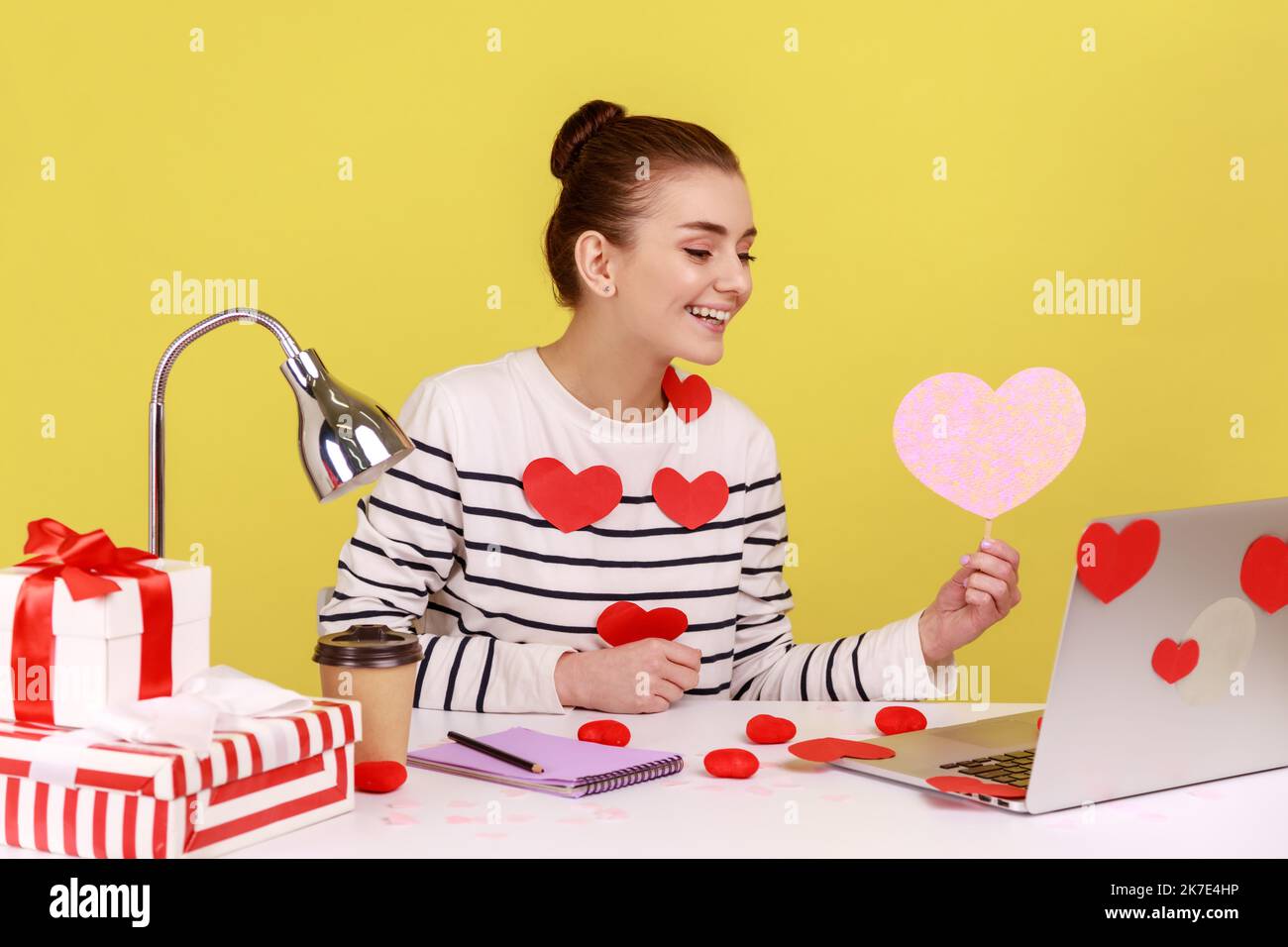 Smiling delighted woman office manager having video call while sitting ...