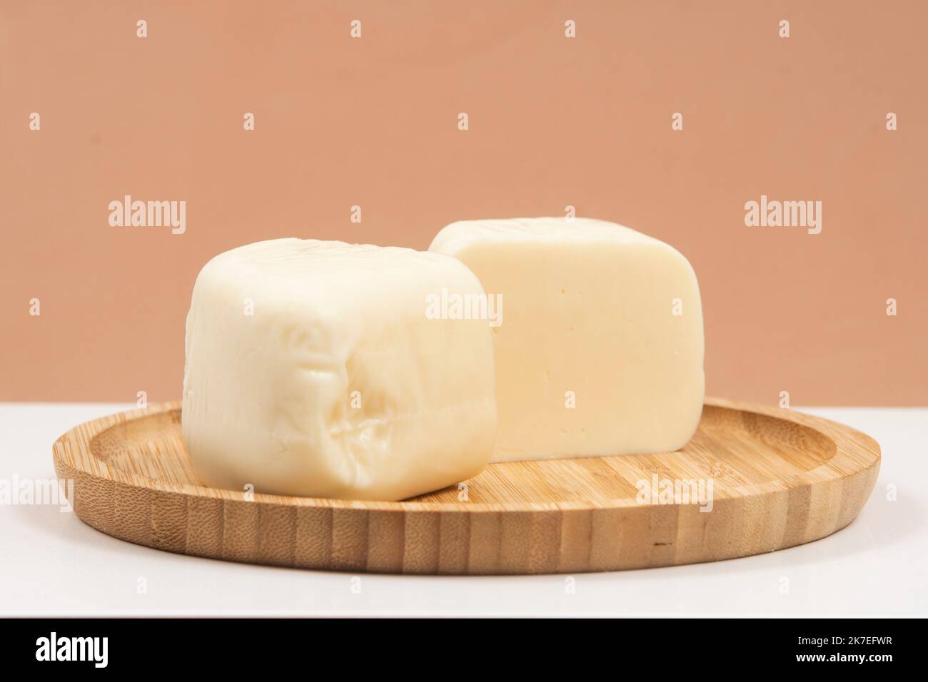 Minas half-cured cheese on a bamboo tray Stock Photo - Alamy