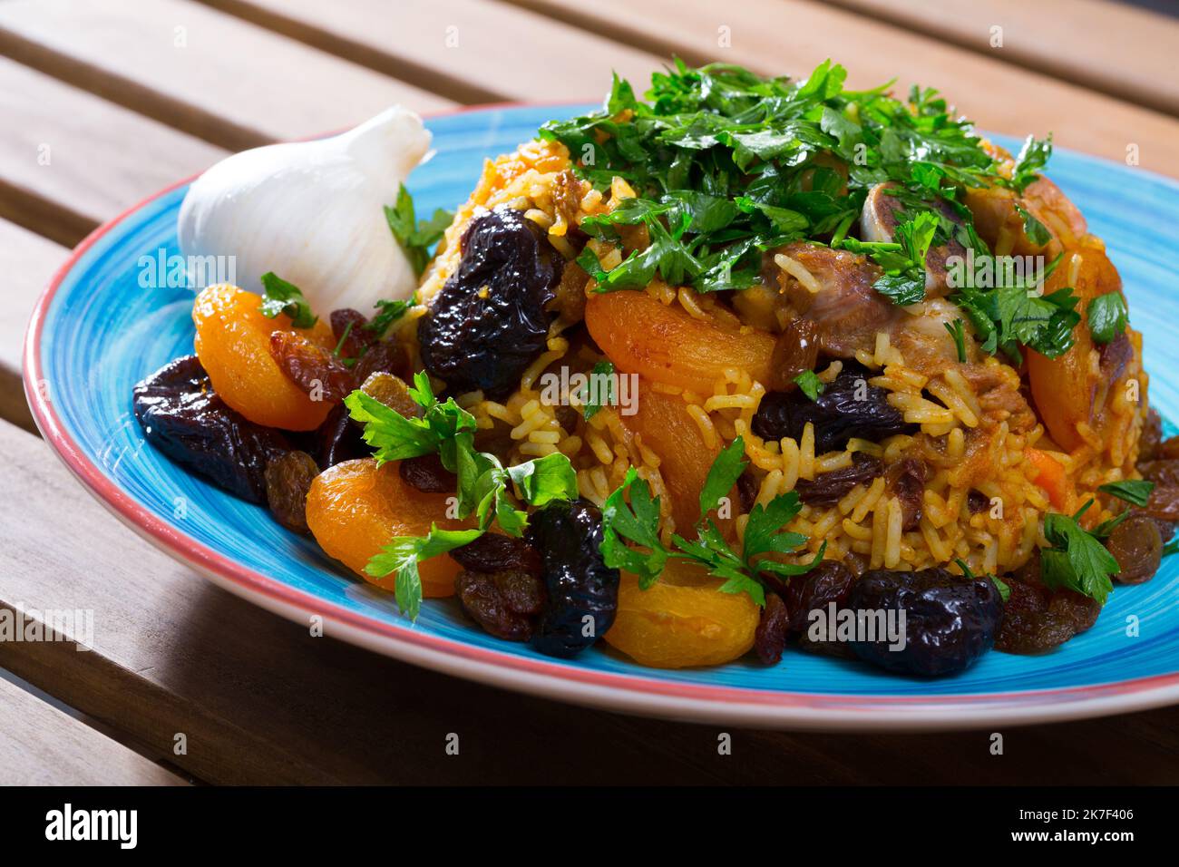 Pilaf from mutton with dried apricots, prunes Stock Photo - Alamy