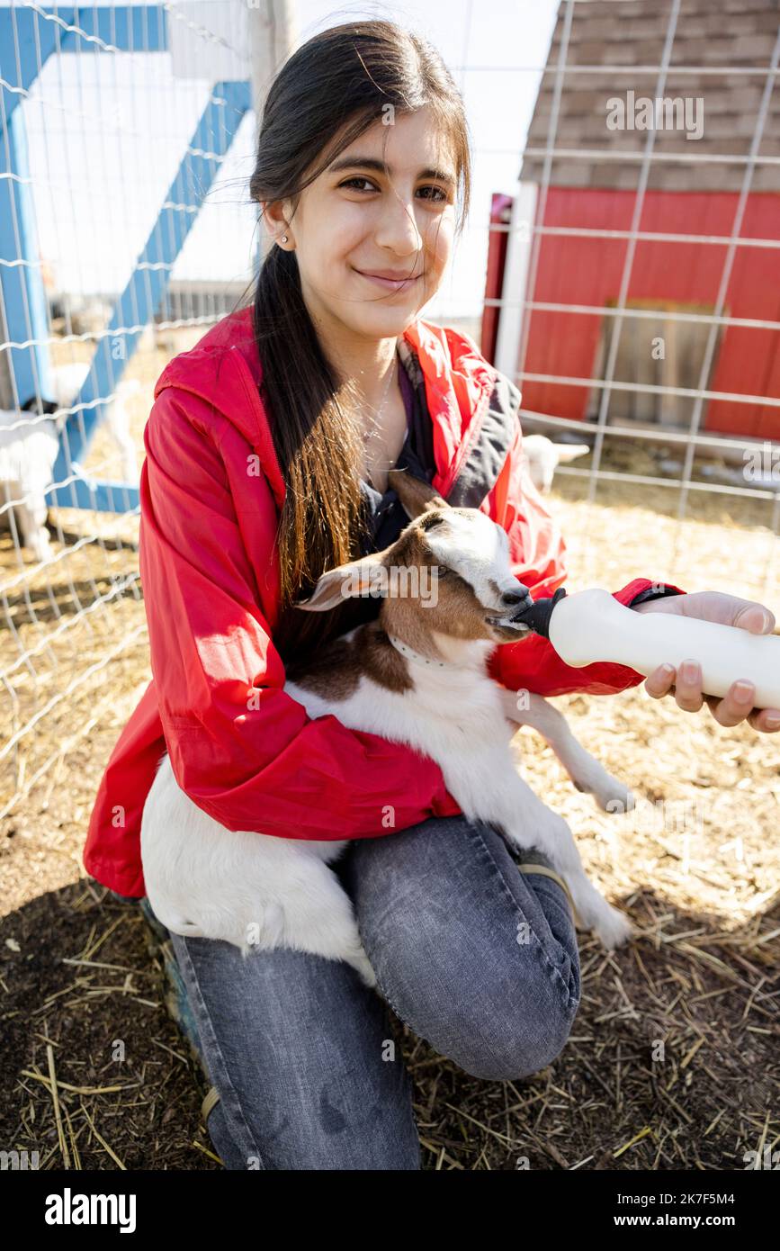 Beautiful girl with goat hi-res stock photography and images - Alamy