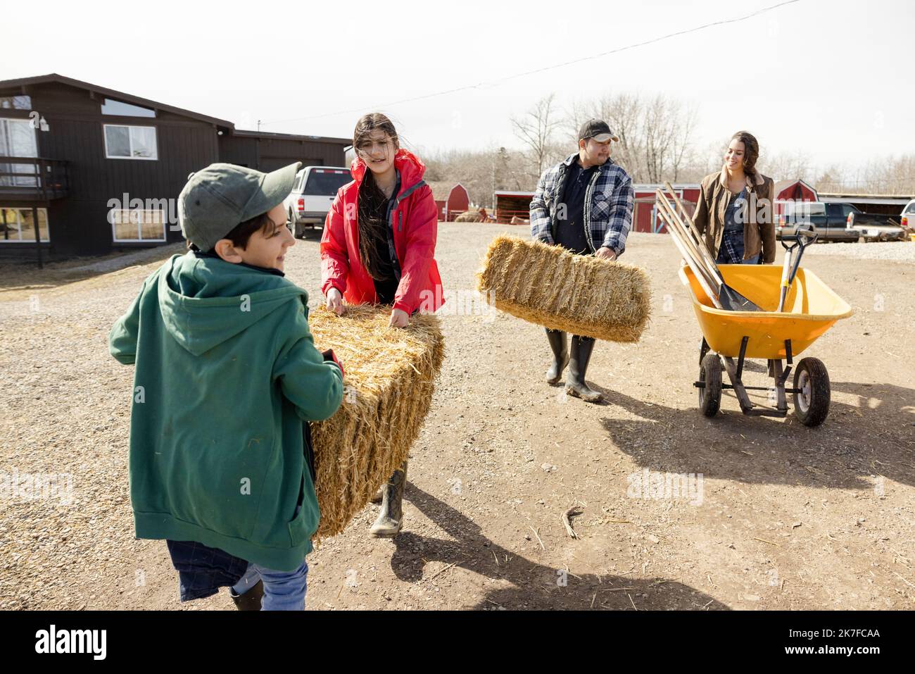 Man carrying hay hi-res stock photography and images - Alamy