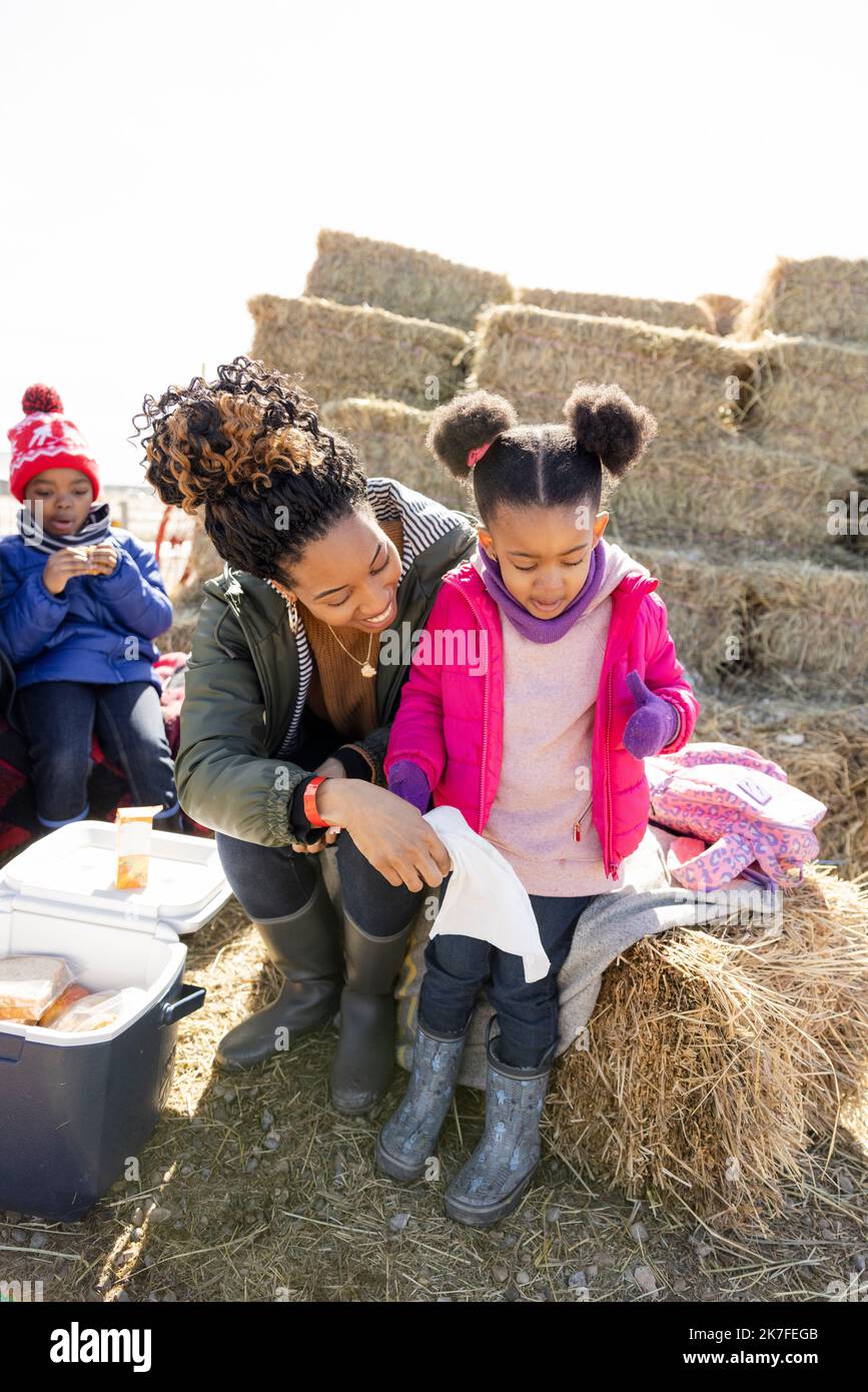 Boy hay bale smiling girl hi-res stock photography and images - Alamy