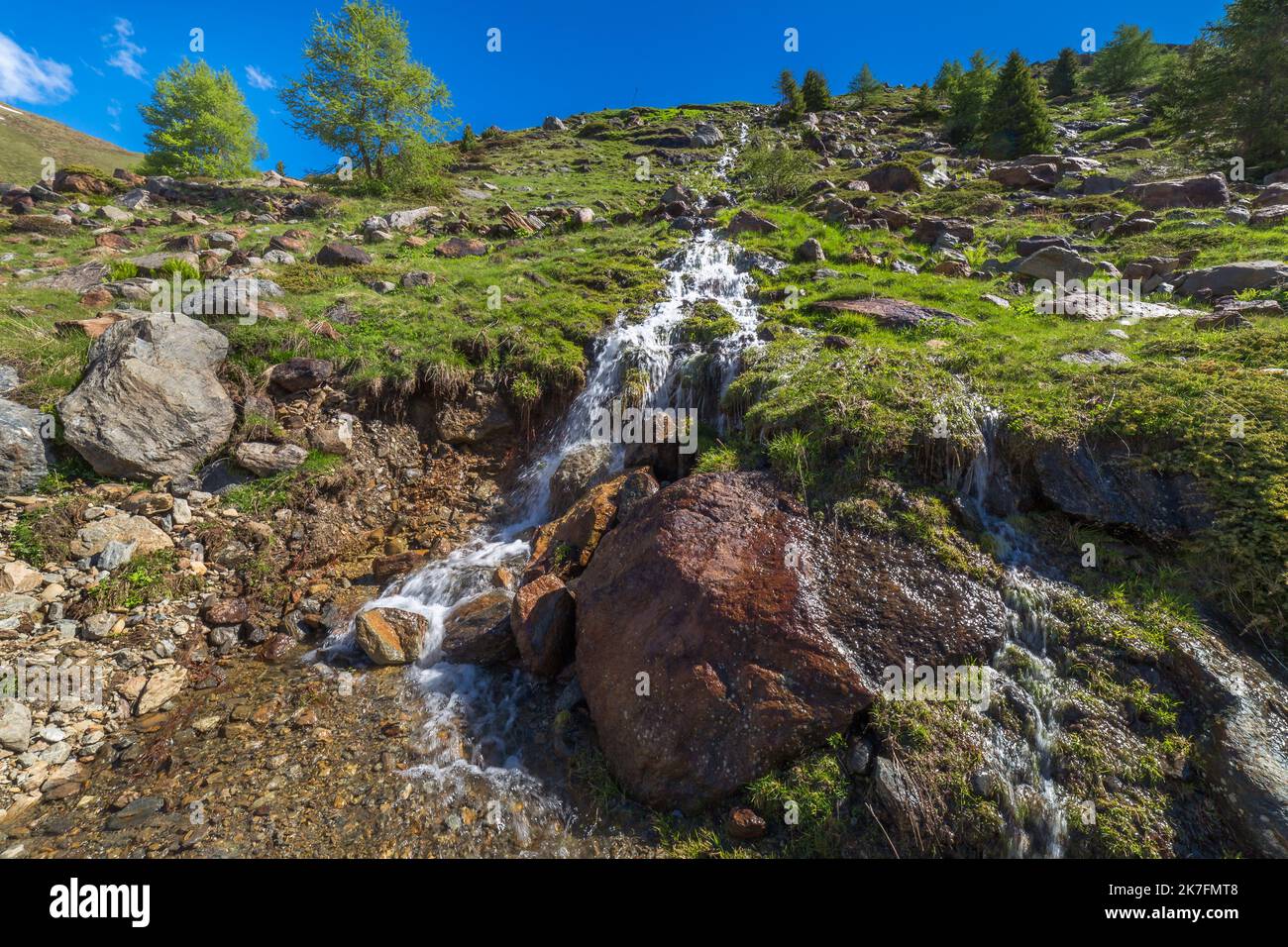 River stream in the mountains, Stelvio national park at clear sky ...