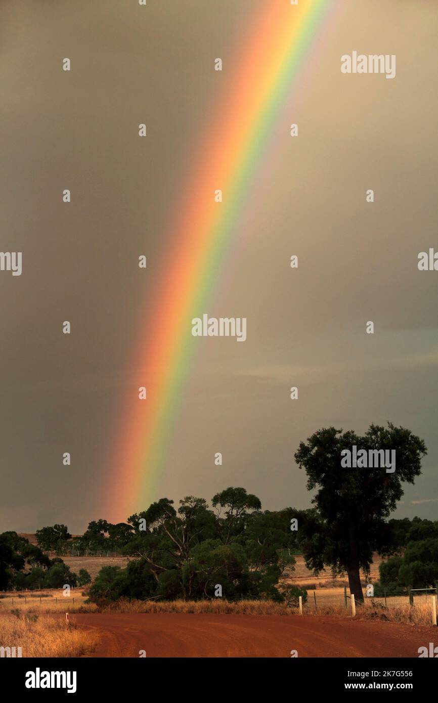 Rainbow in sky, Australia Stock Photo - Alamy