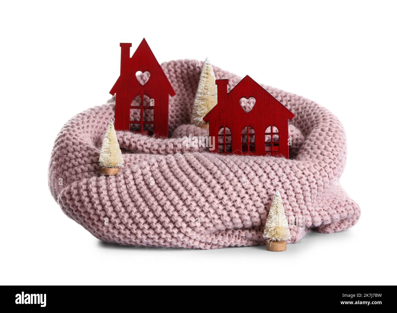 House figures with scarf and decorative fir trees on white background ...
