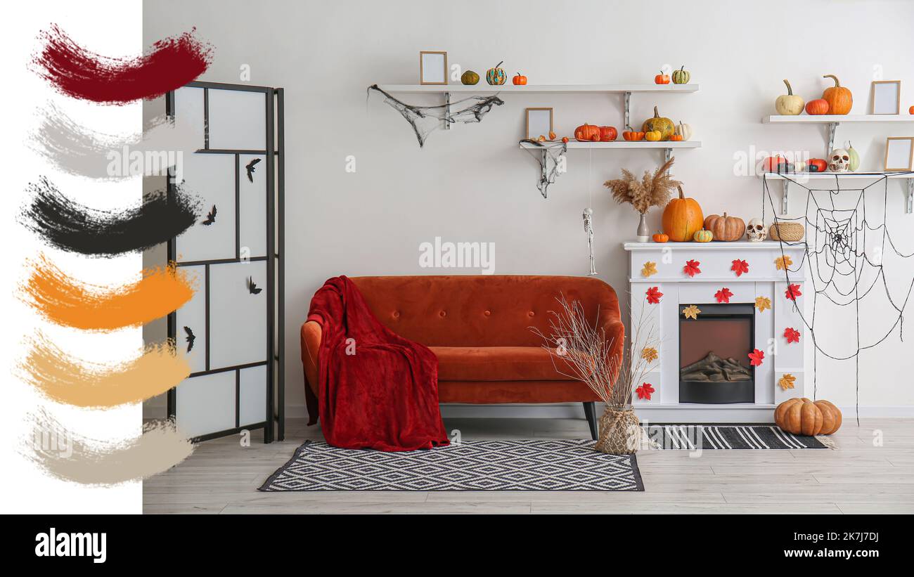 Interior of light living room decorated for Halloween party. Different ...