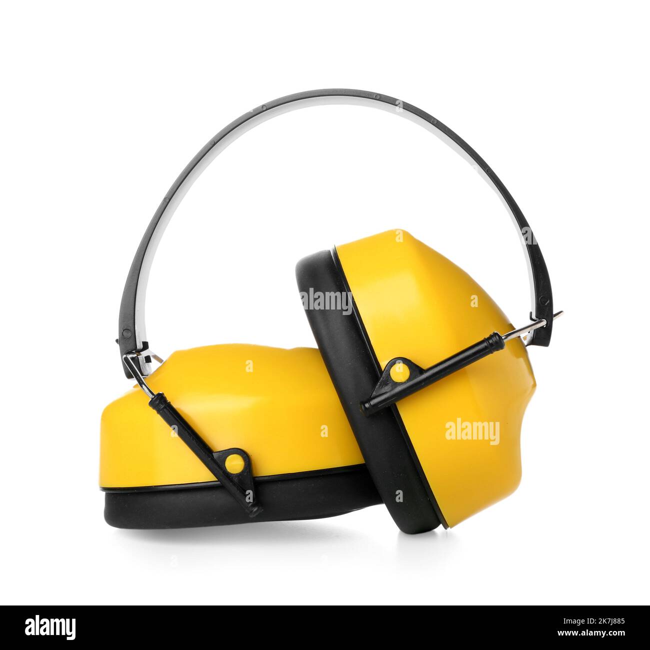Yellow hearing protectors on white background Stock Photo - Alamy