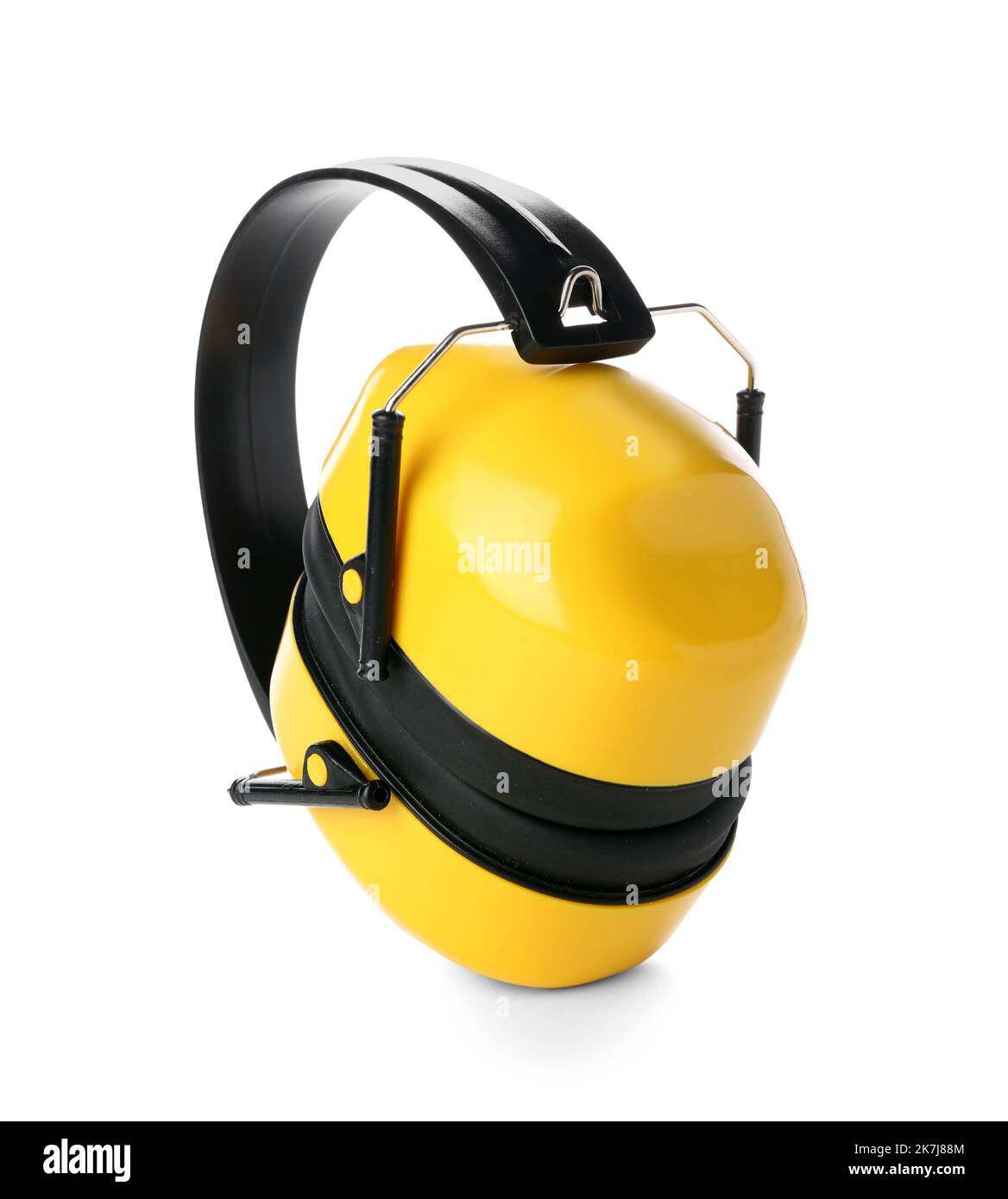 Yellow hearing protectors on white background Stock Photo - Alamy