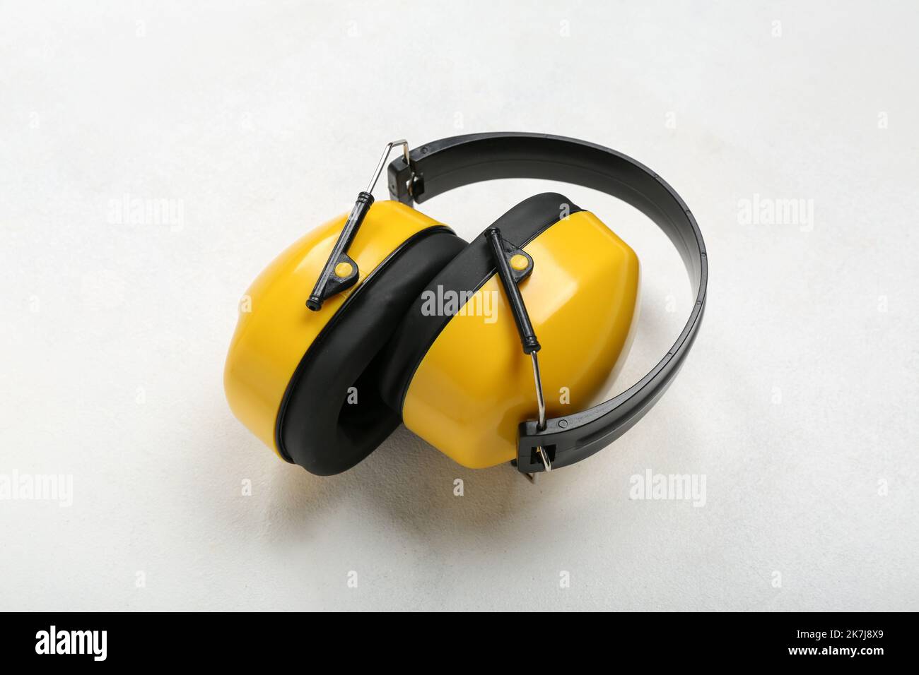 Hearing protectors on light background Stock Photo - Alamy