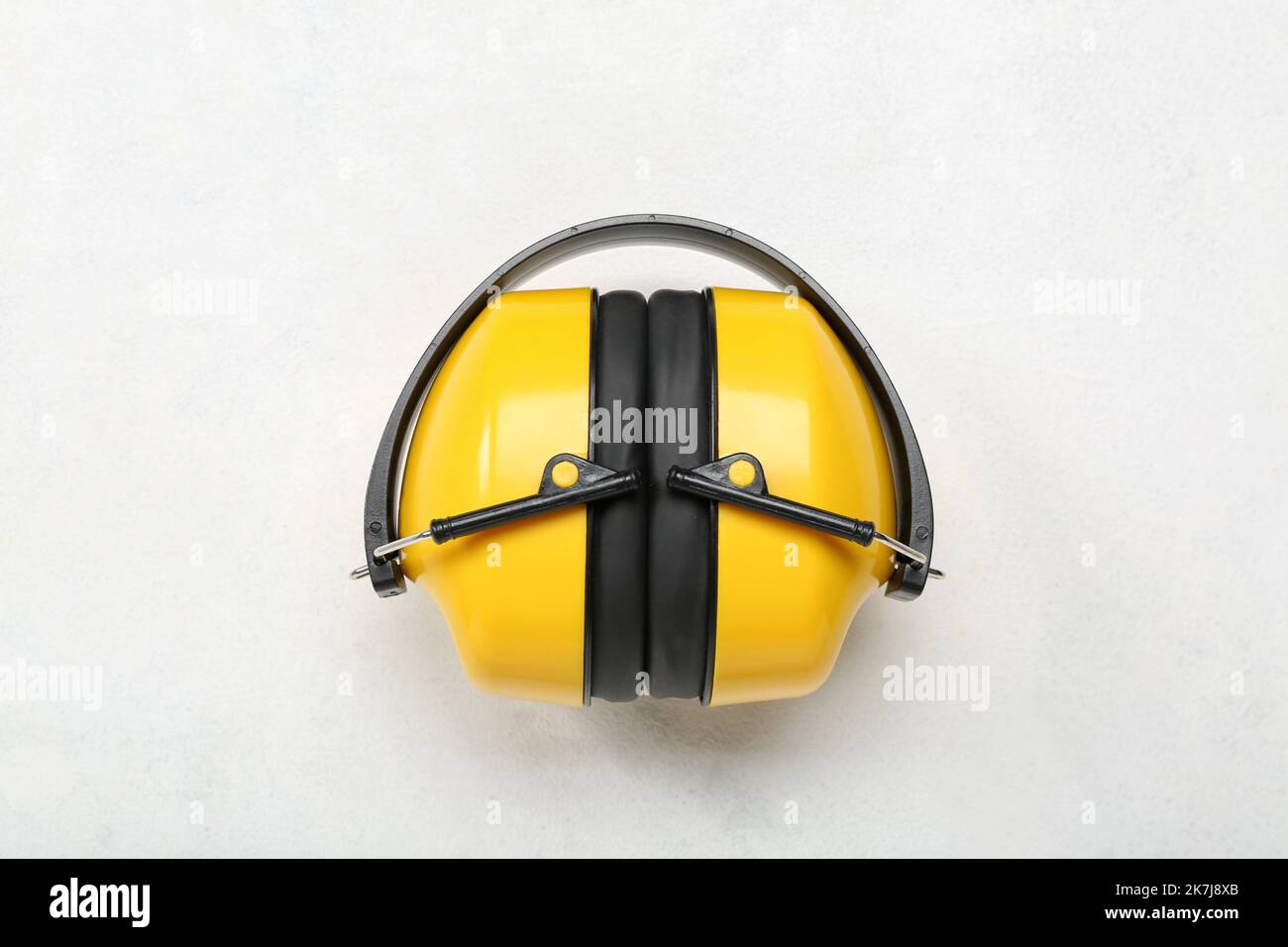 Hearing protectors on light background Stock Photo - Alamy