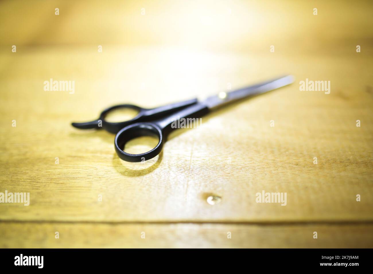 Plastic hair cutting scissors Isolated on wooden Background Stock Photo ...