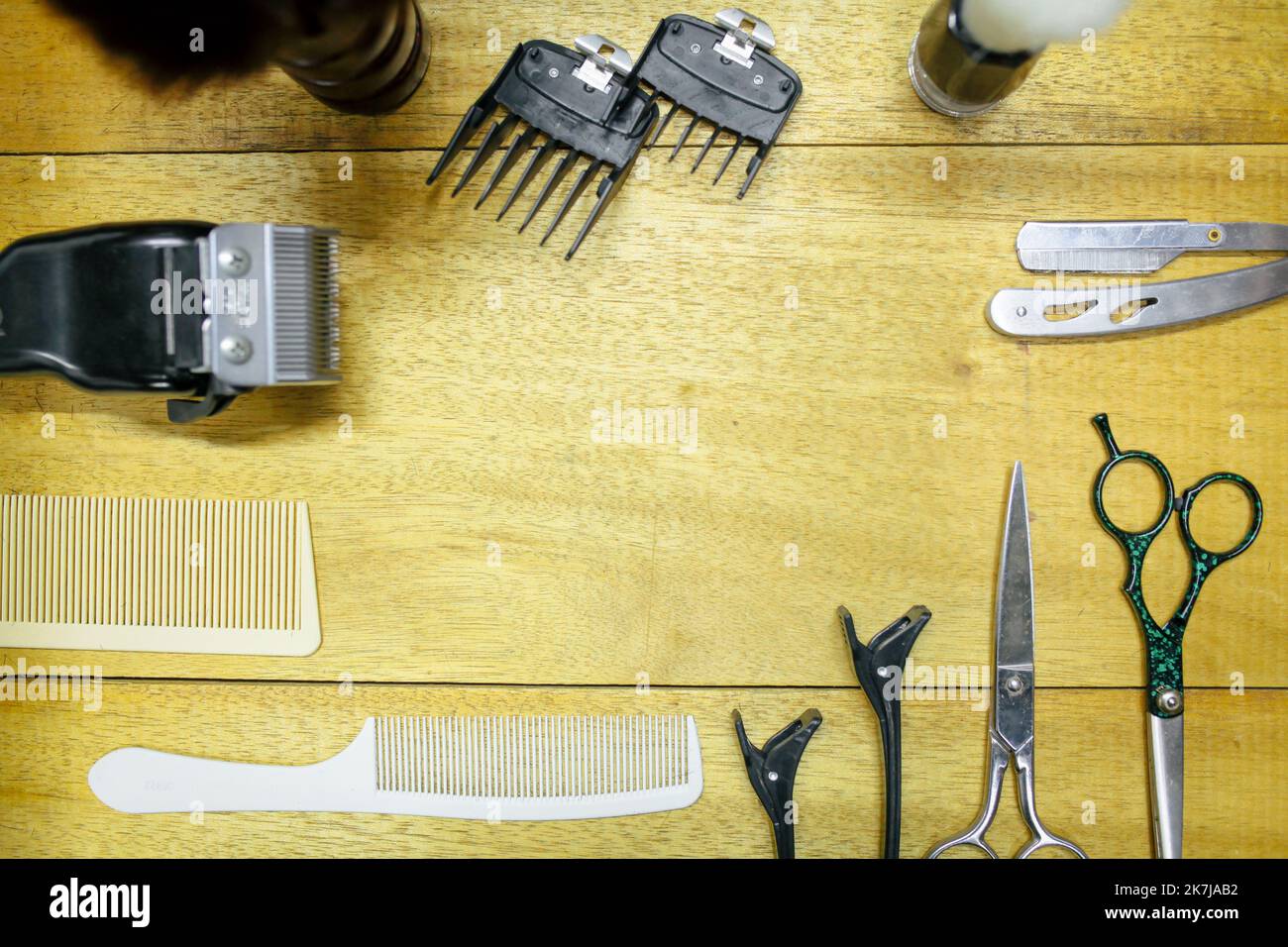 Top view of various professional barber tools on black background Stock ...