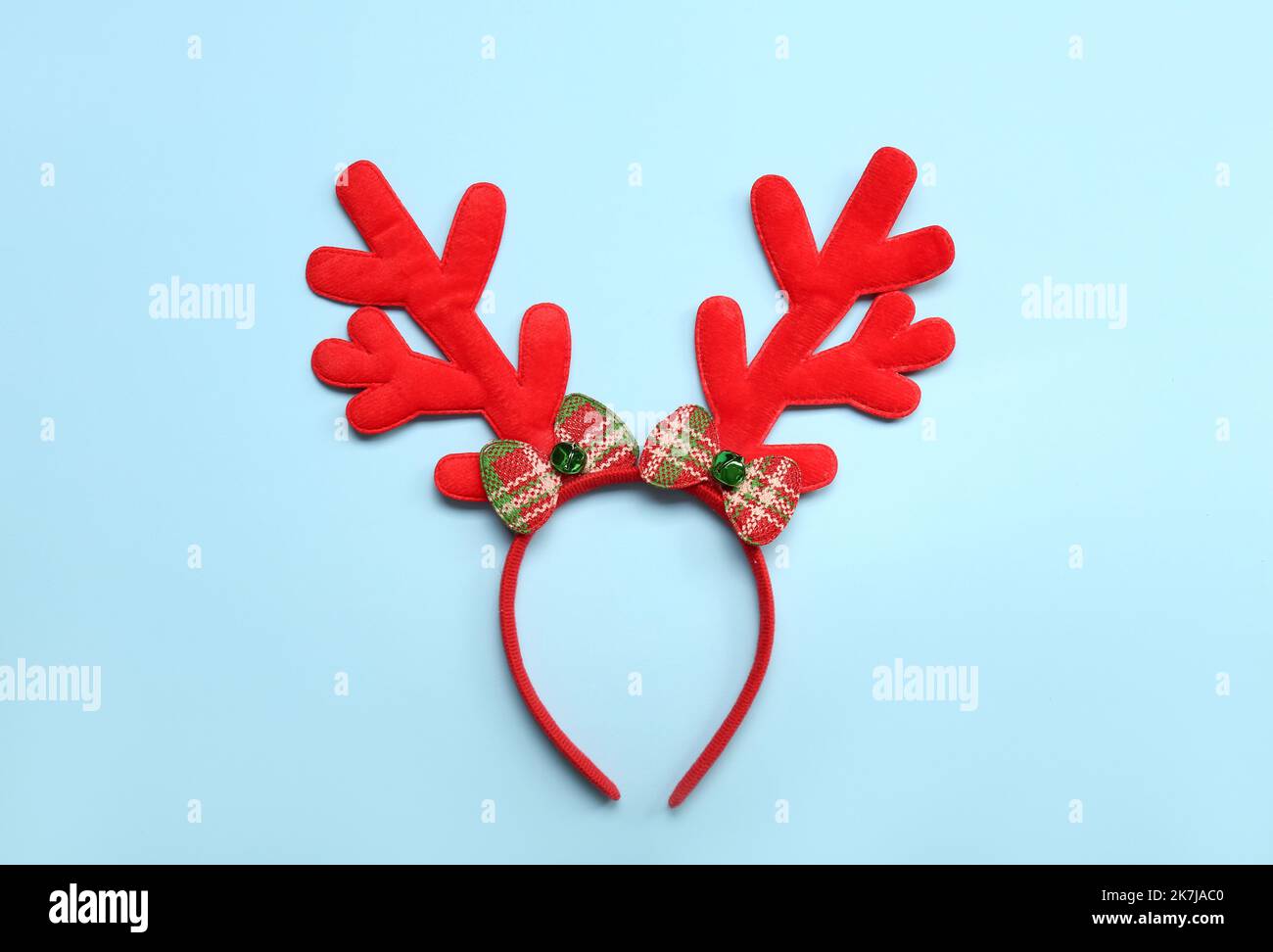 Beautiful red Christmas reindeer horns on color background Stock Photo ...