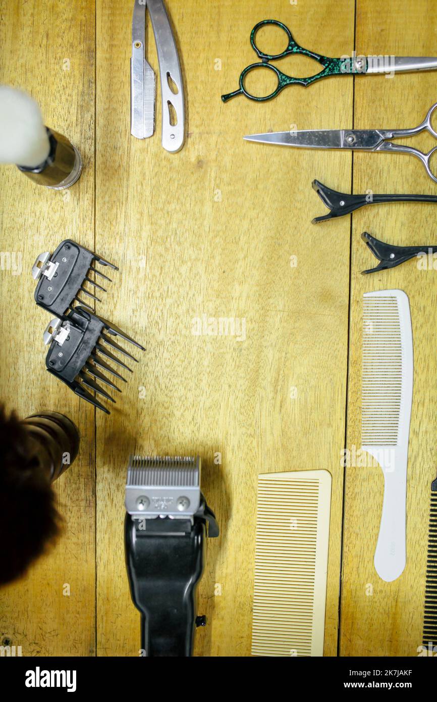 Top view of various professional barber tools on black background Stock ...
