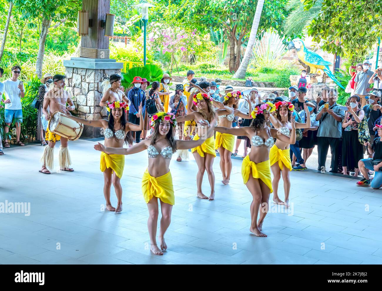 A group of Latin American performers dance sports in swimsuits to serve ...