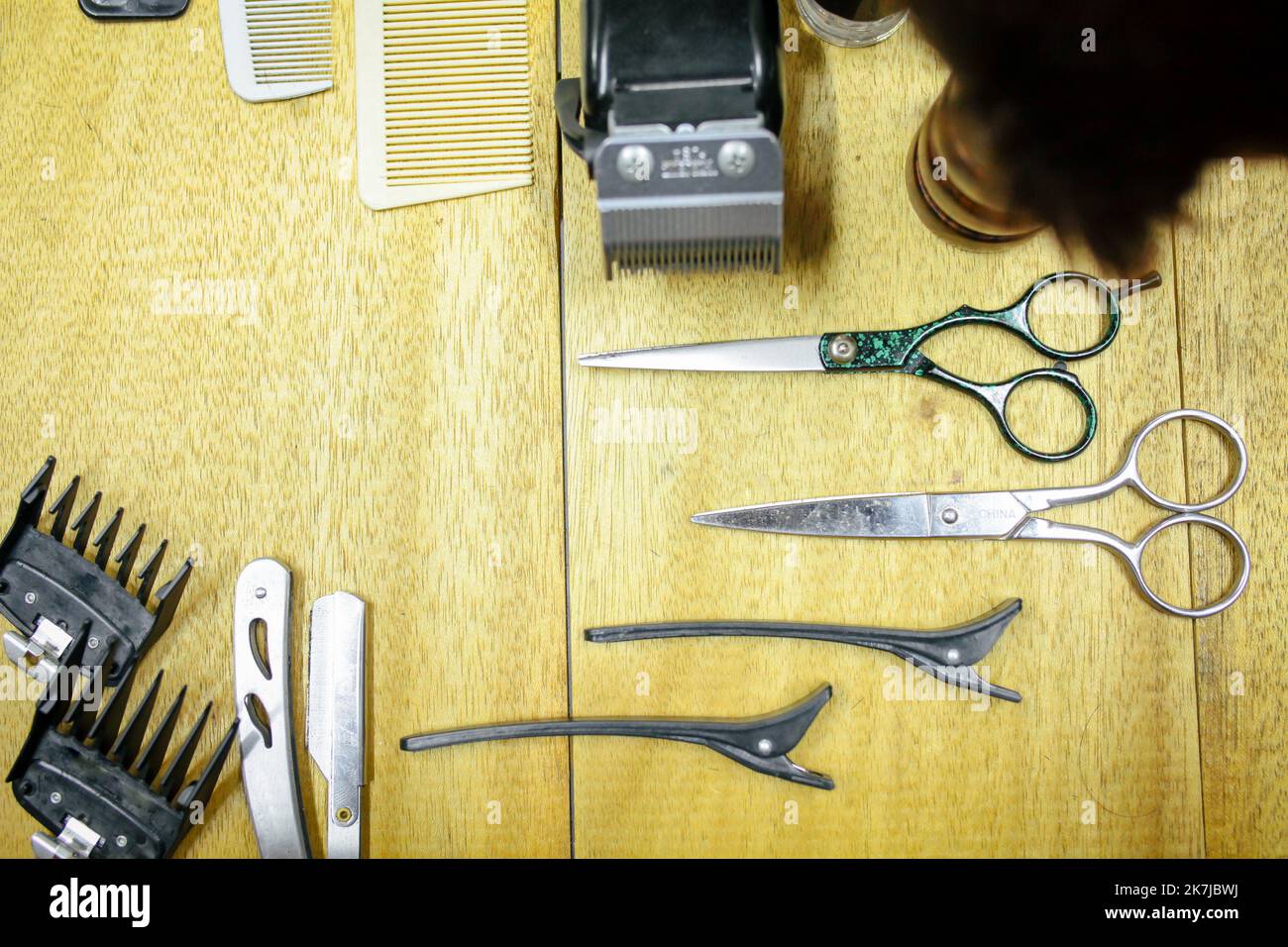 Top view of various professional barber tools on black background Stock ...