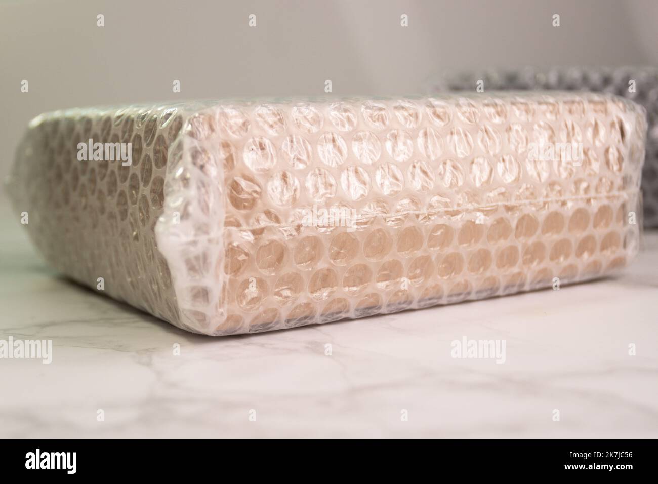 Bubbles covering the box by bubble wrap for protection product cracked or insurance During ...