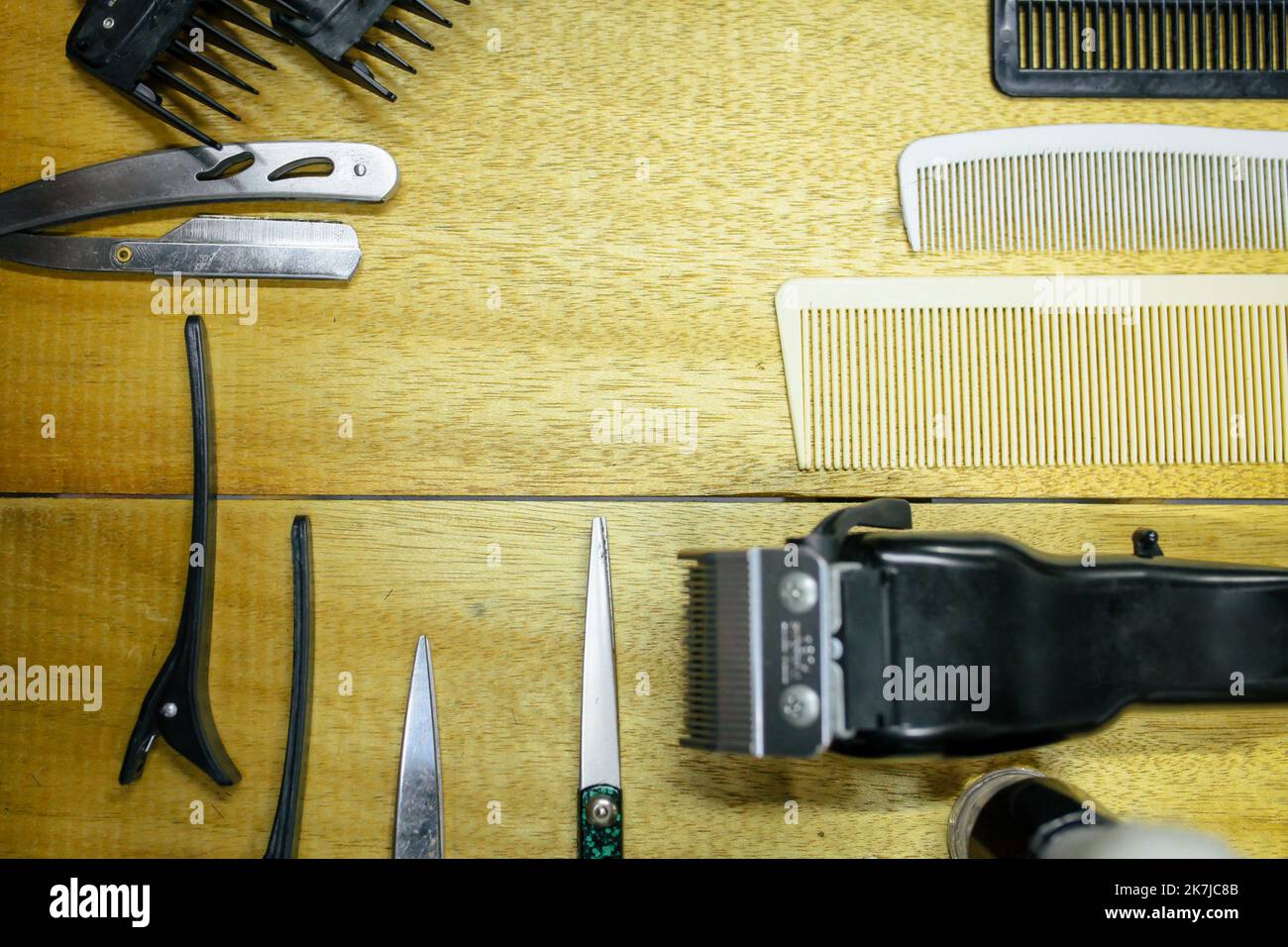 Top view of various professional barber tools on black background Stock ...