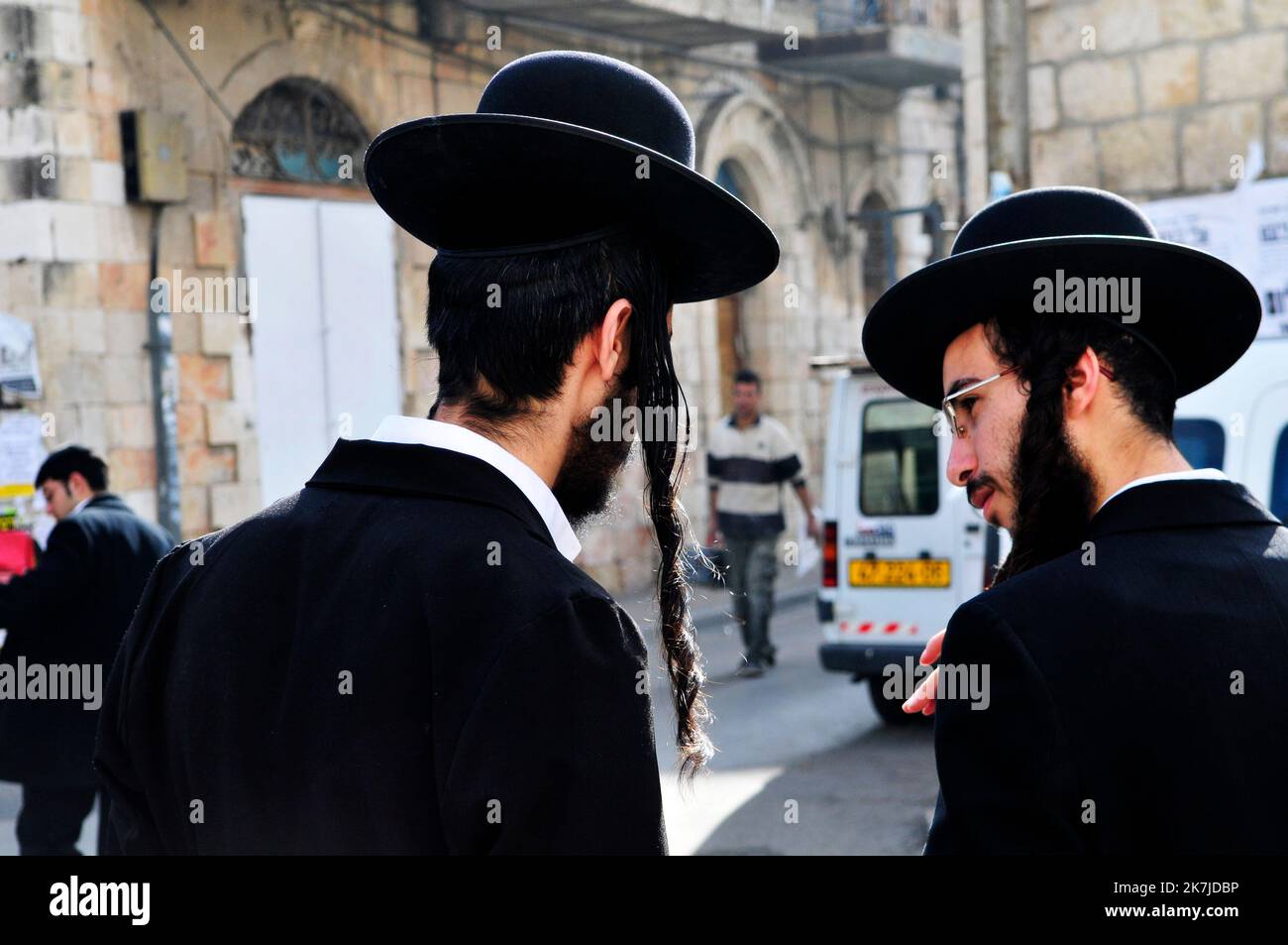 Haredi Jewish men socializing in the Geula ultra-Orthodox neighborhood ...