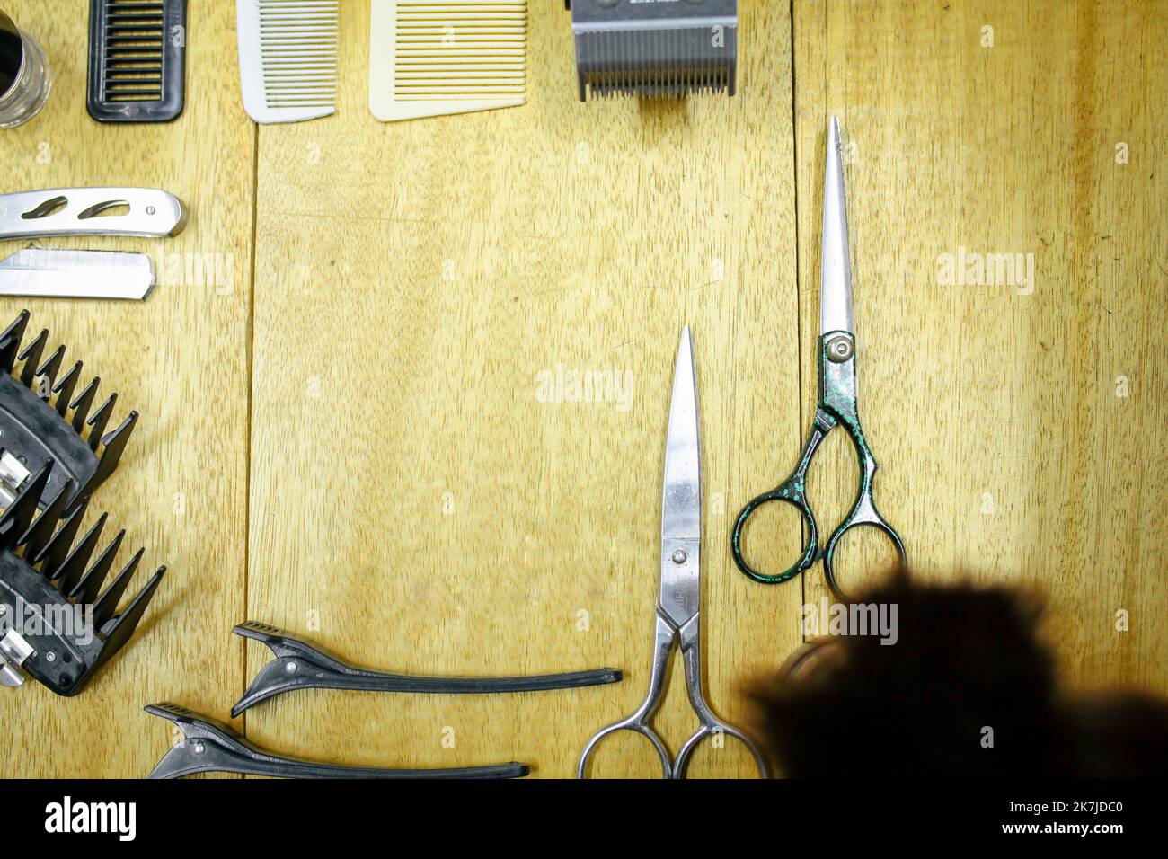 Top view of various professional barber tools on black background Stock ...