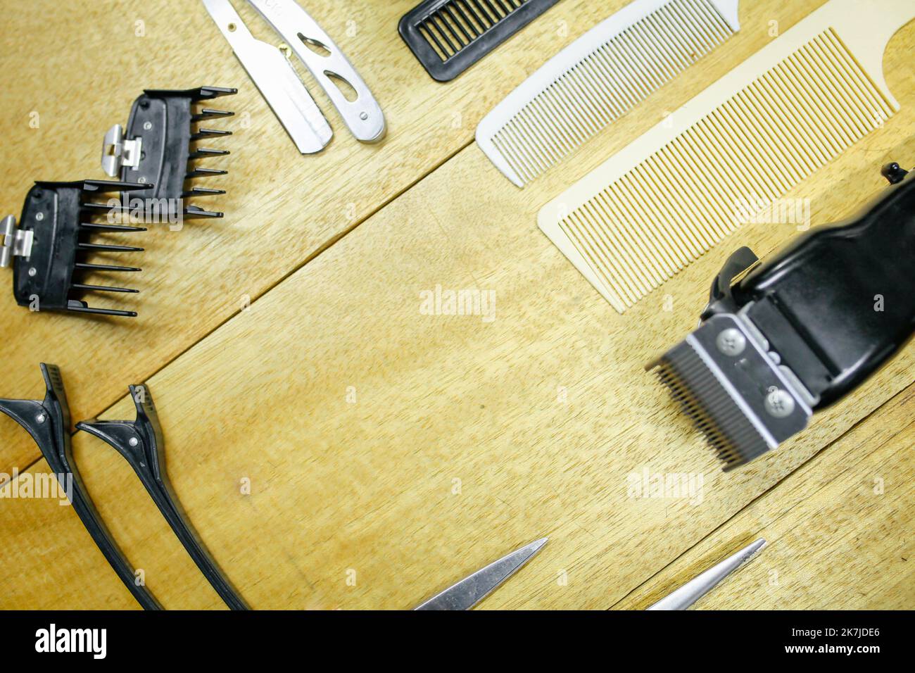 Top view of various professional barber tools on black background Stock ...