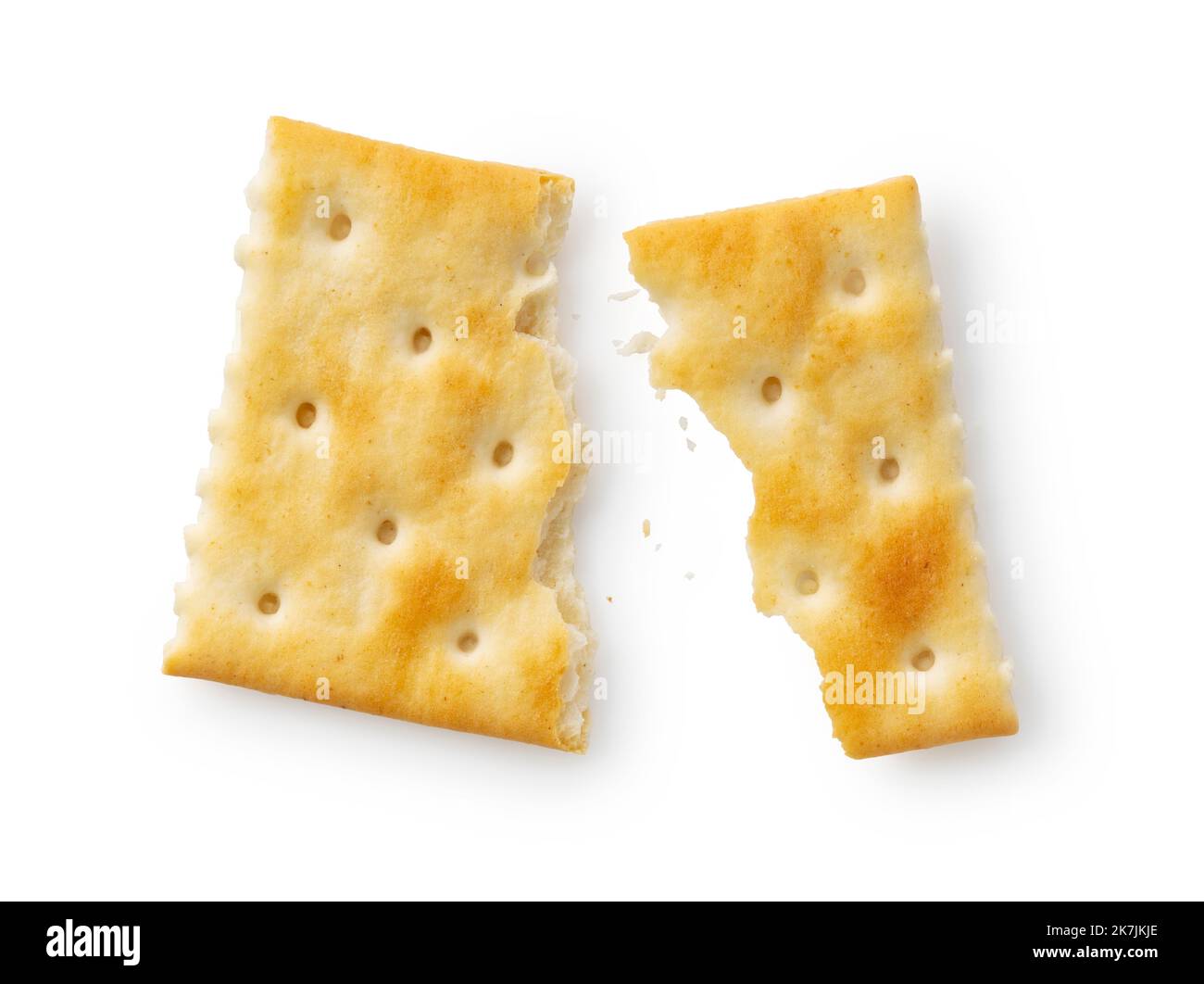 Broken crackers placed on a white background. Viewed from above Stock ...