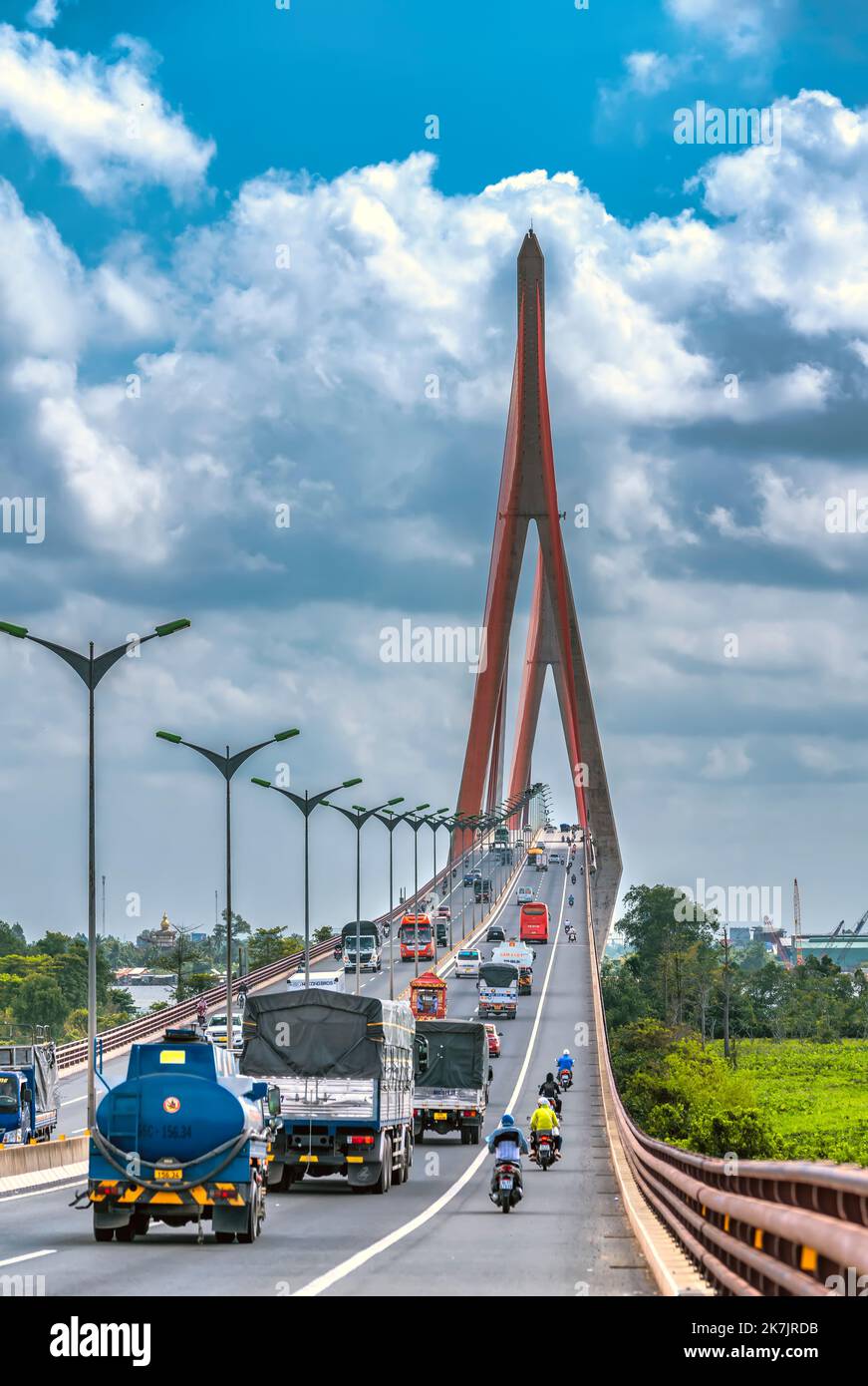 Heavy traffic on Can Tho bridge on summer afternoon . Can Tho bridge is ...