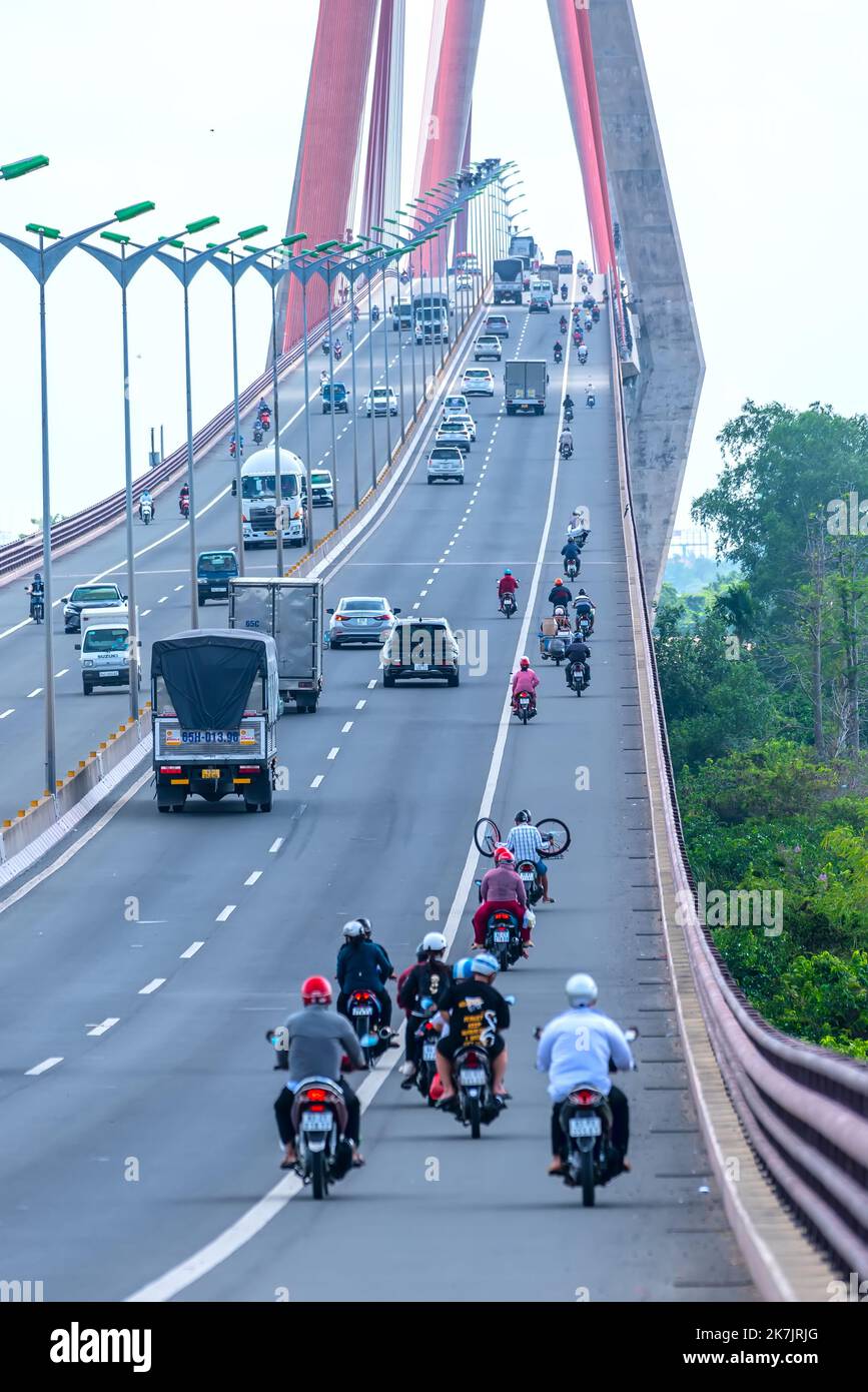 Heavy traffic on Can Tho bridge on summer afternoon . Can Tho bridge is ...