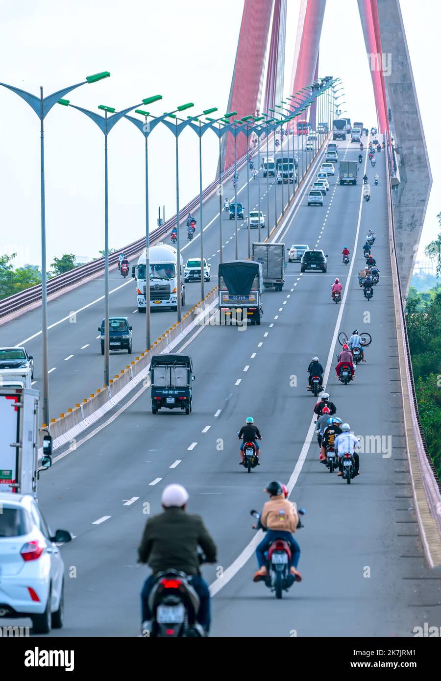 Heavy traffic on Can Tho bridge on summer afternoon . Can Tho bridge is ...