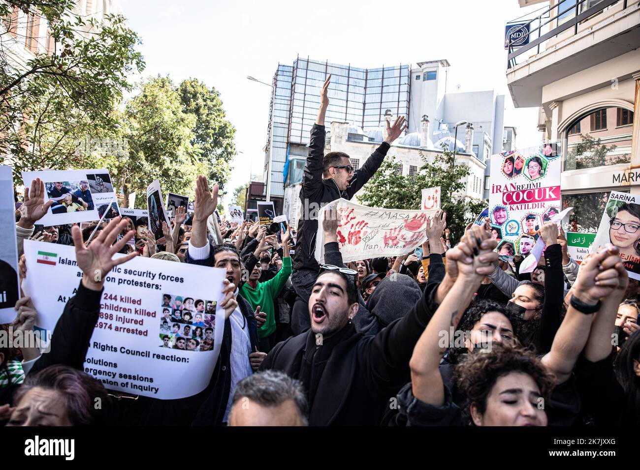 Istanbul, Turkey. 17th Oct, 2022. Protesters hold placards and chant ...