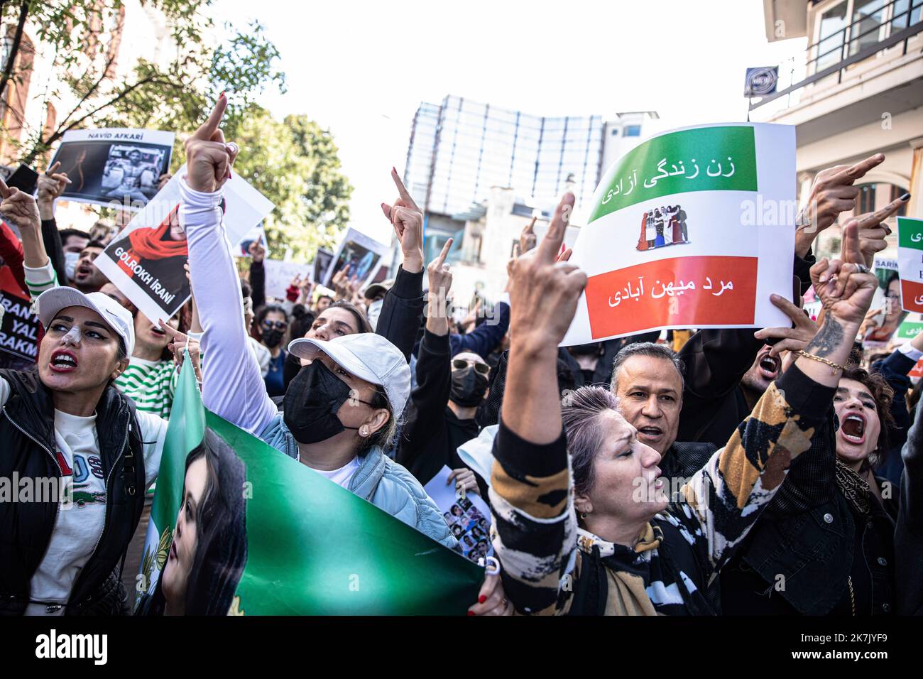 (EDITOR'S NOTE : Image contains profanity) People hold signs and chant ...