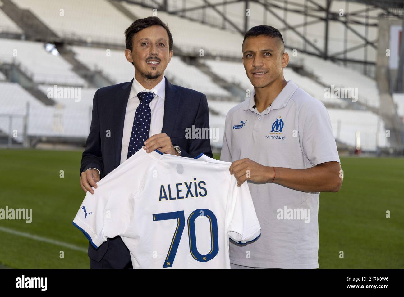 Marseille's Chilean forward Alexis Sanchez looks on as he attends a ...