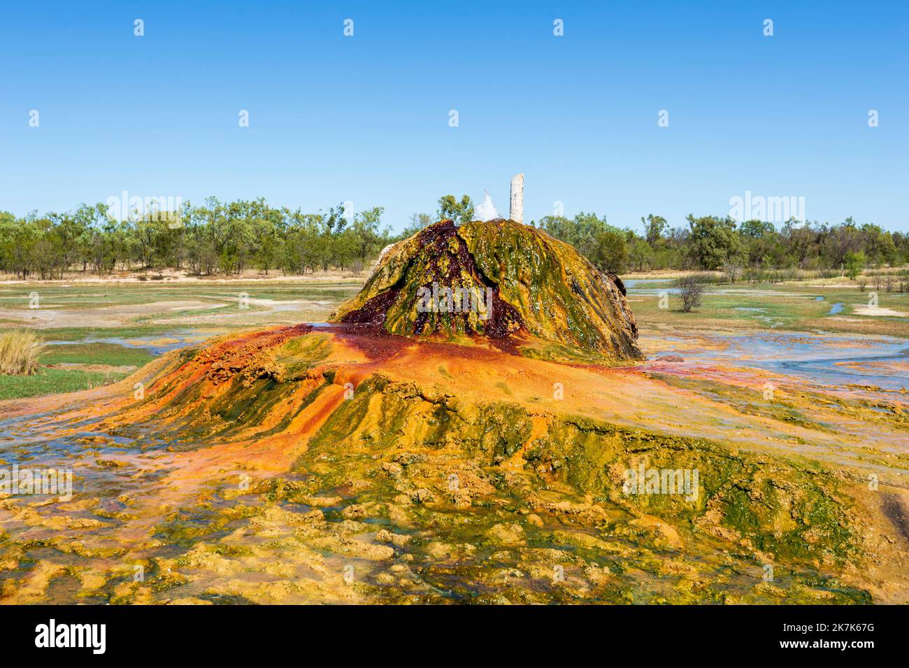 View of a century-old Artesian Bore showing colourful mineral deposits ...