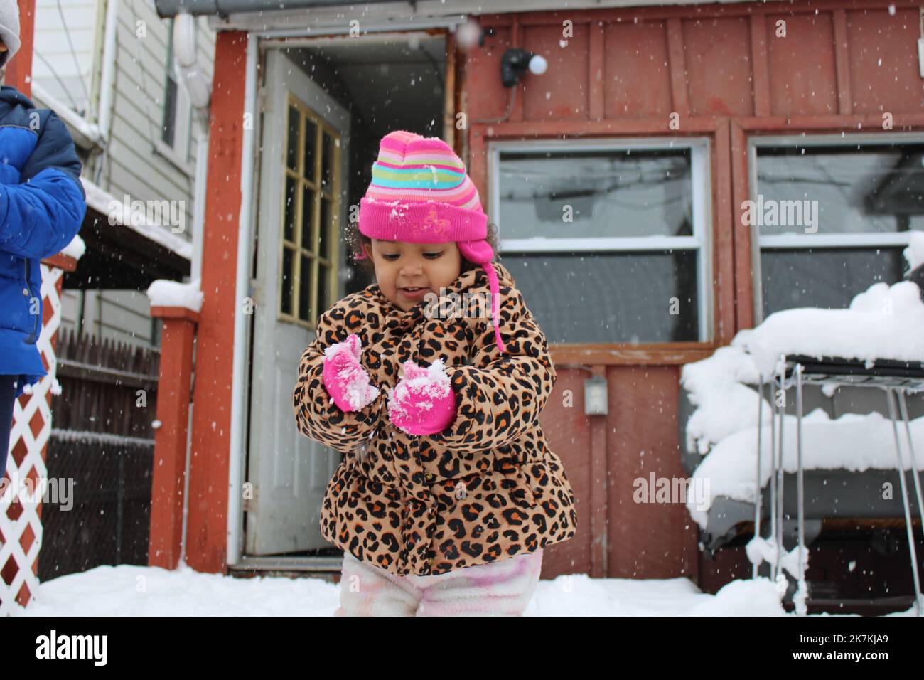 baby playing in the snow Stock Photo - Alamy