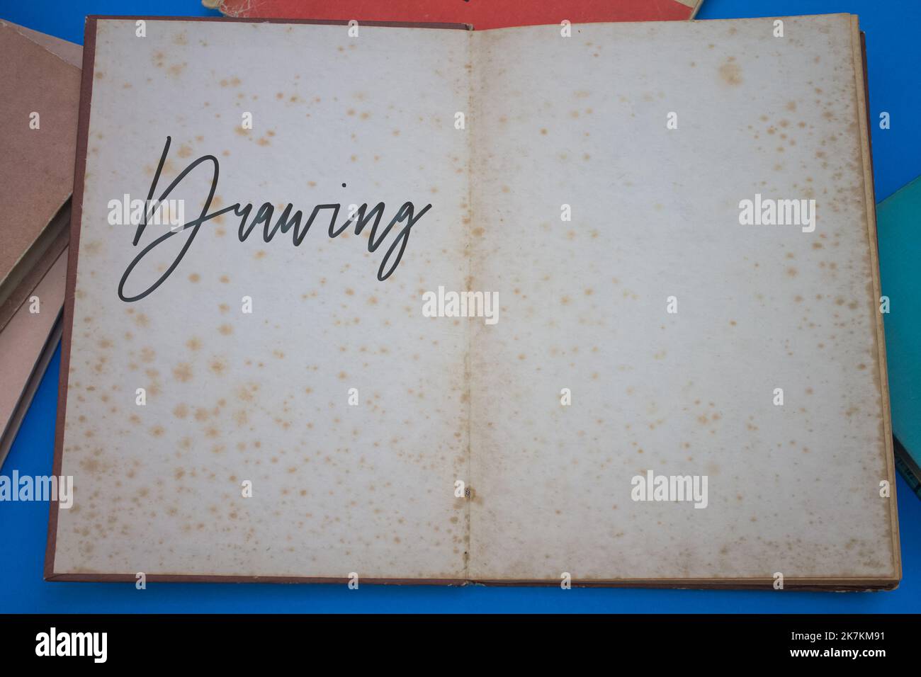 Drawing word in opened book with vintage, natural patterns old antique ...