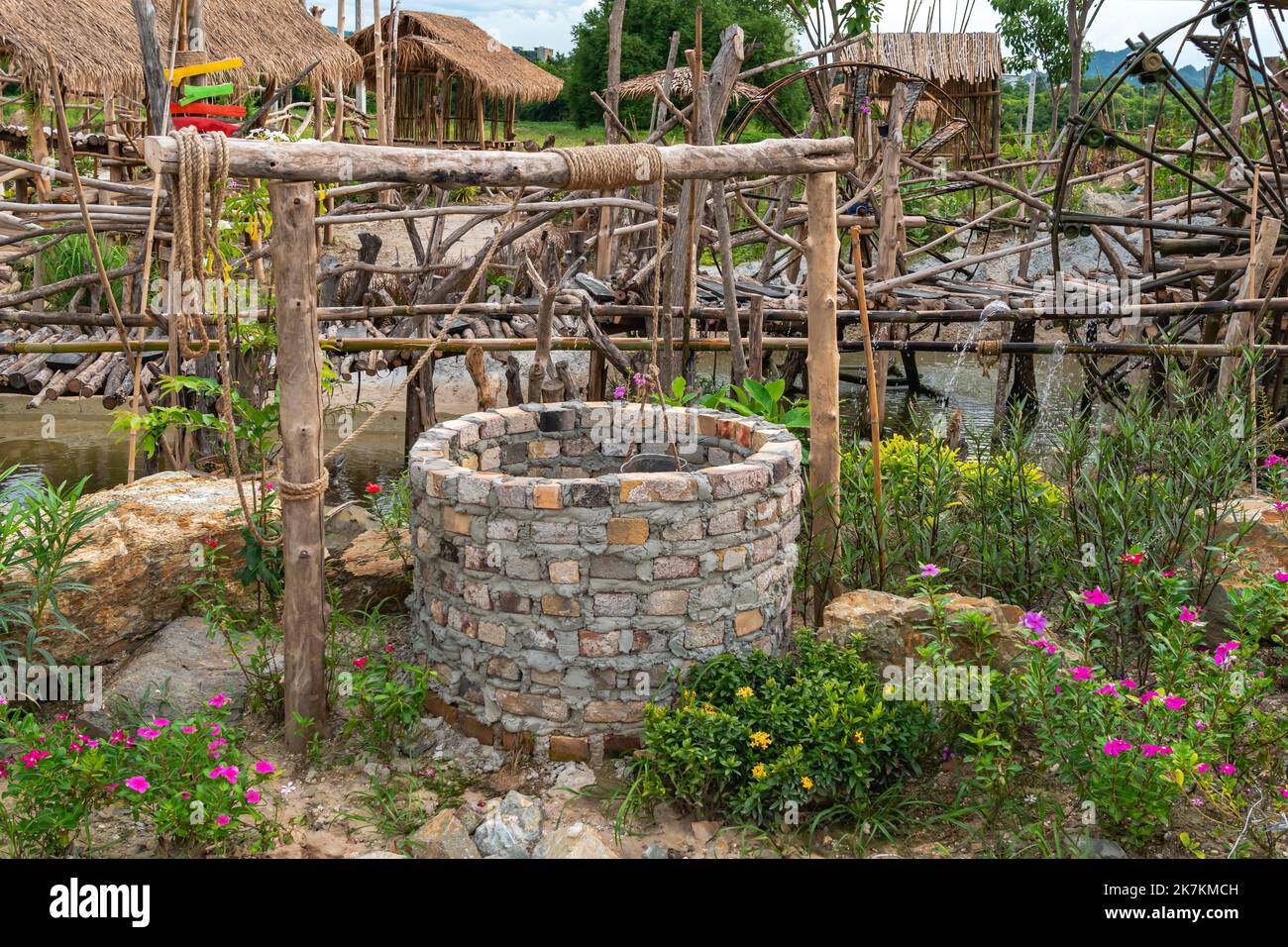 Beautiful artesian well made by bricks with cement and wheel pulley ...