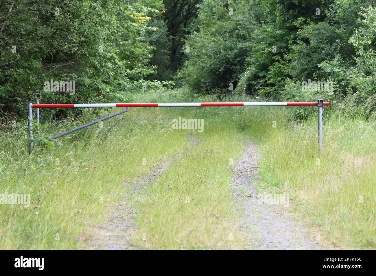 A turnpike blocks the way in a natural setting Stock Photo - Alamy