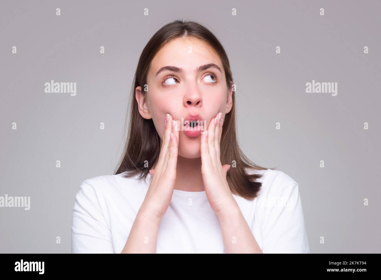 Shocked face of surprised young woman. Funny female shocked face ...