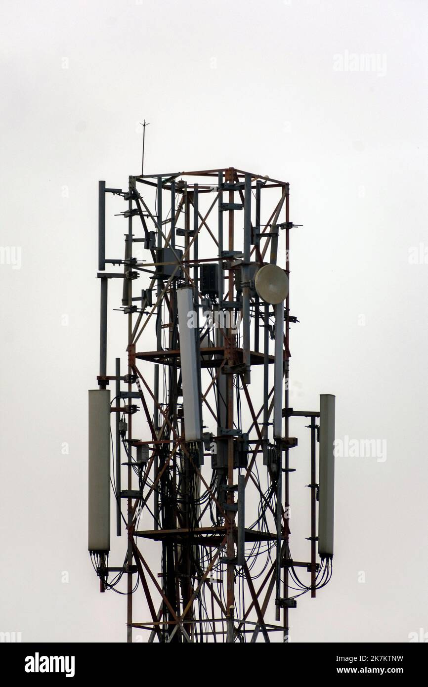 Mobile phone tower closeup isolated on white background Stock Photo - Alamy
