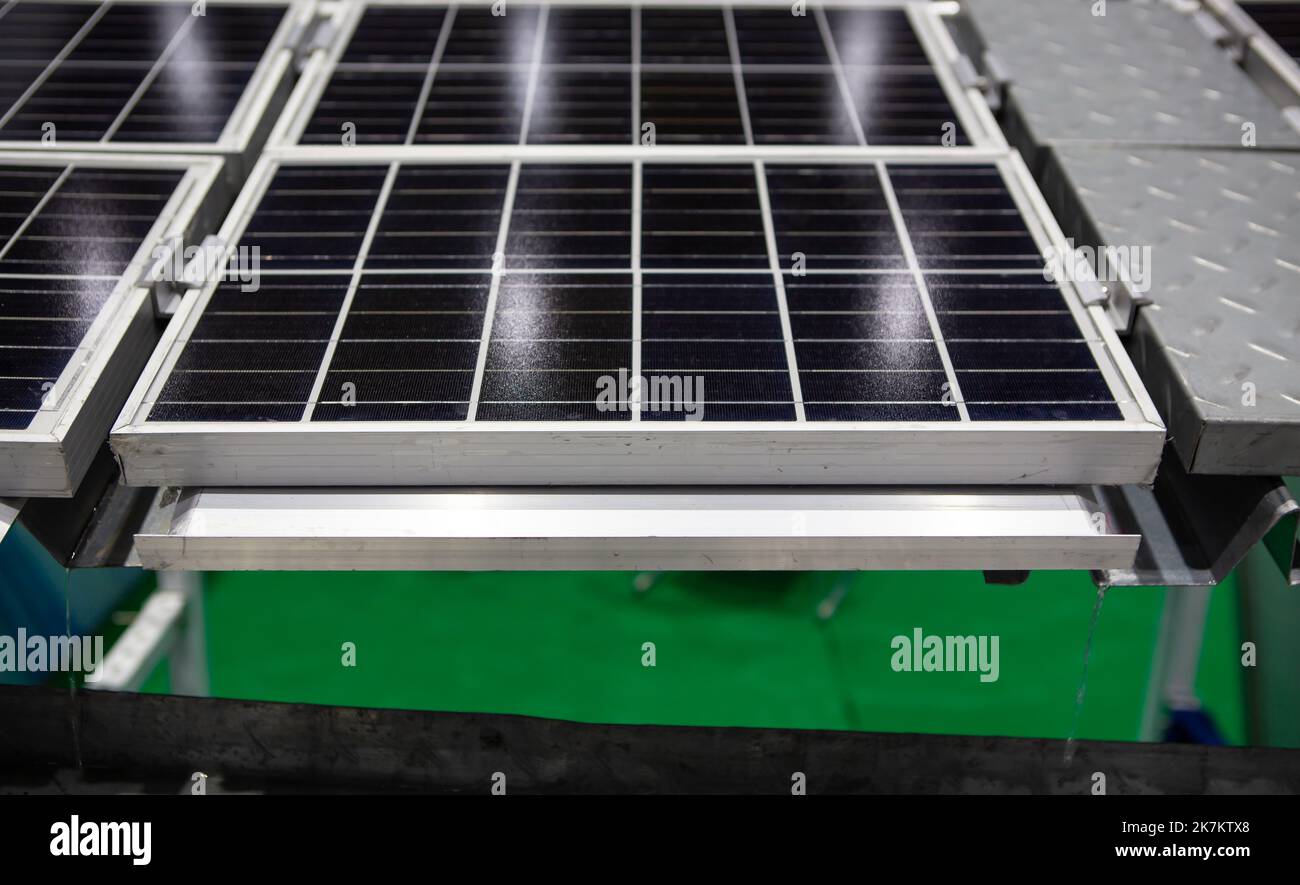 Close-up of Photovoltaic panel system installation with rain gutter ...