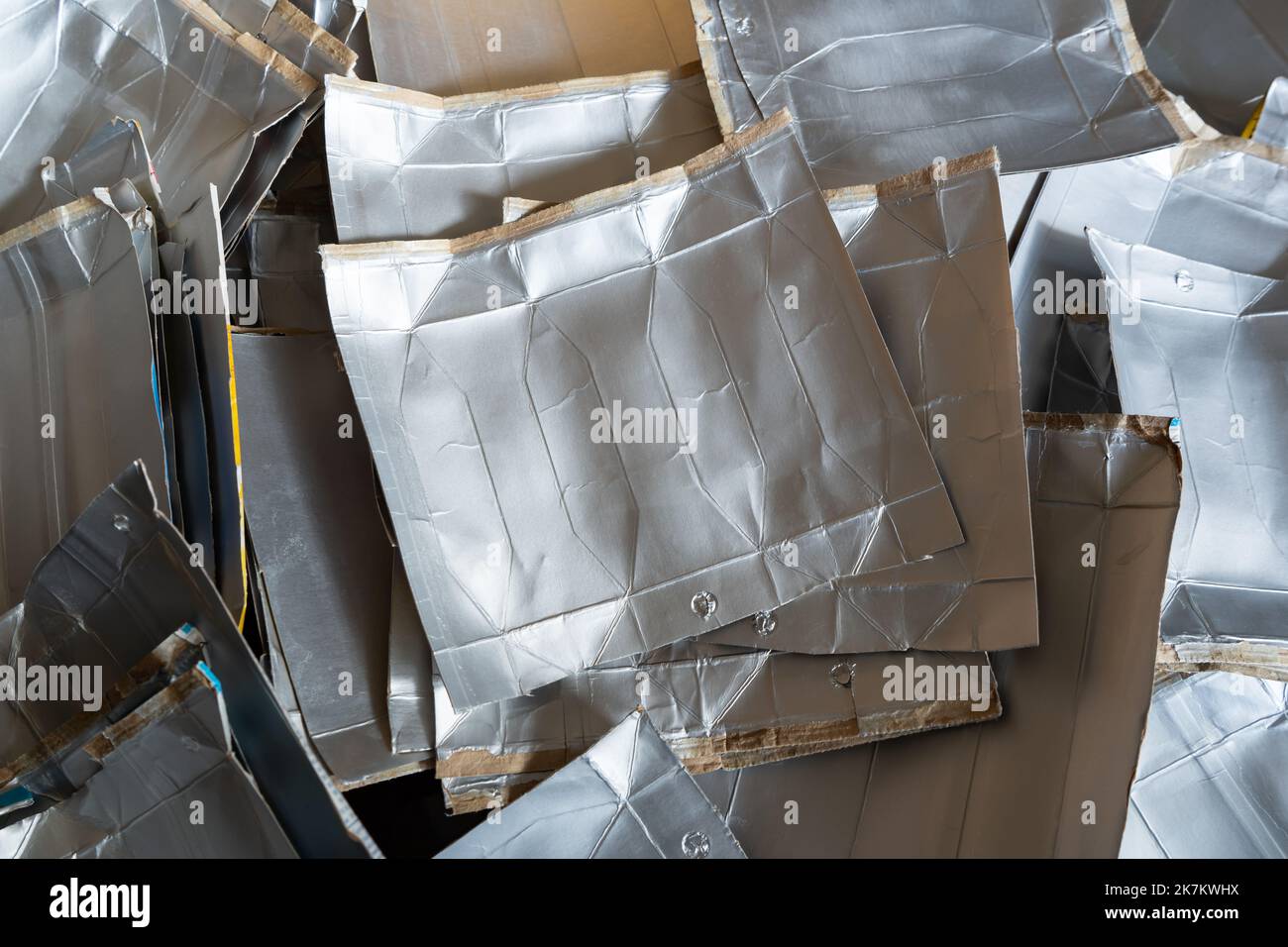 Milk carton packages collected for recycling Stock Photo - Alamy