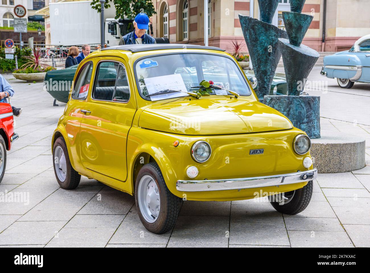 BADEN BADEN, GERMANY - JULY 2019: small yellow FIAT 500 TOPOLINO 1957 ...