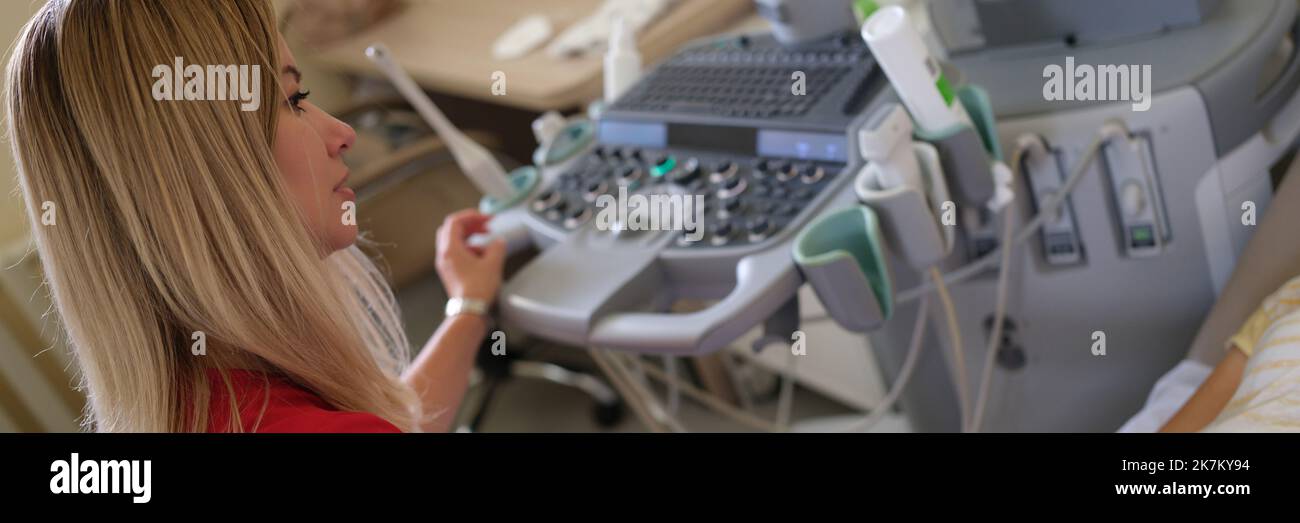 Doctor performs ultrasound examination abdomen hi-res stock photography ...