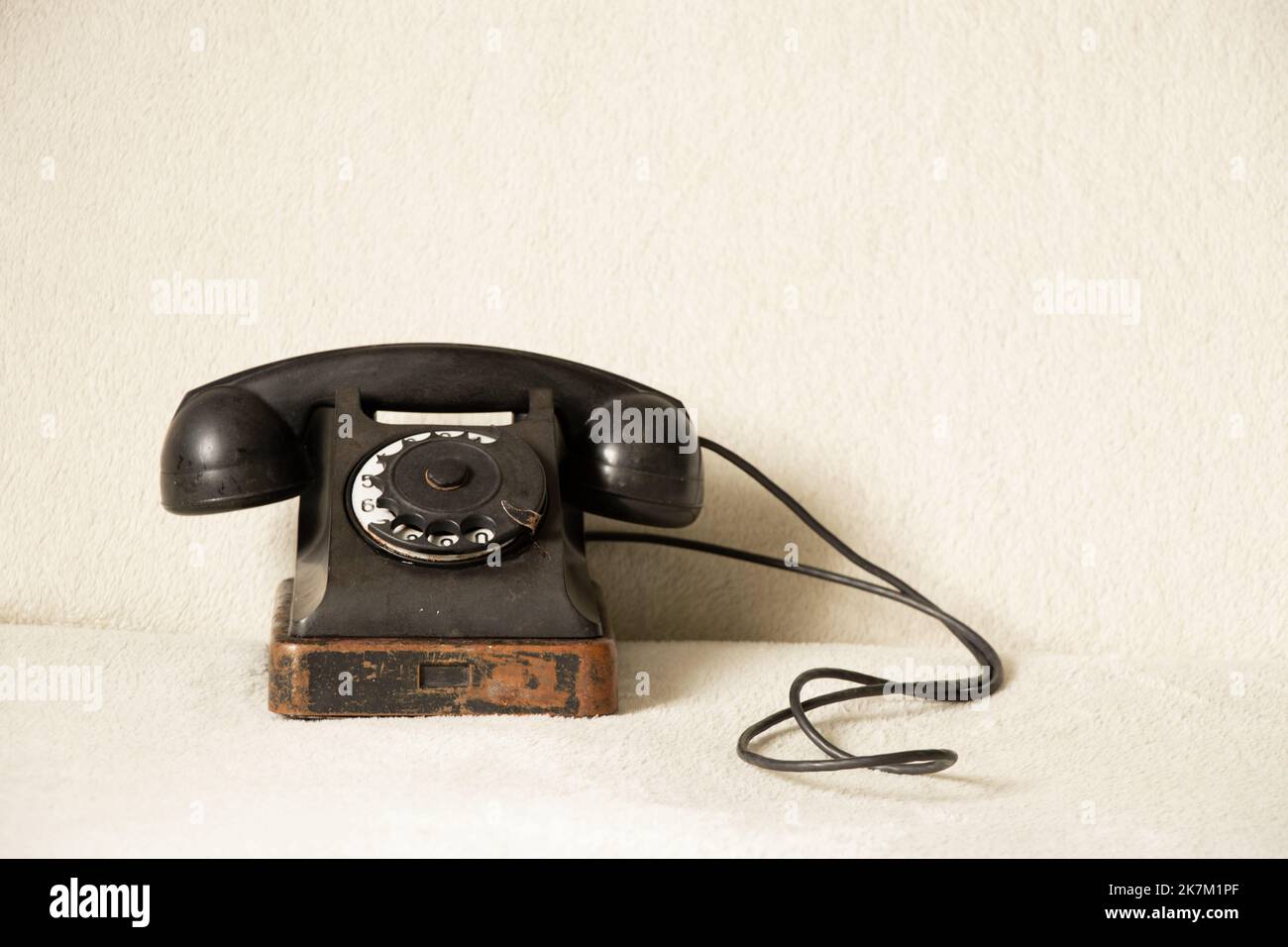 Old black retro phone on isolated background , rotary phone and ...