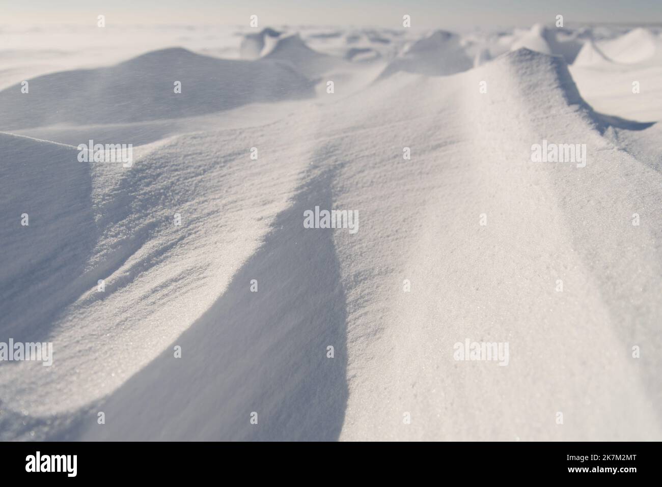 Snow drifts in the sunlight Stock Photo - Alamy