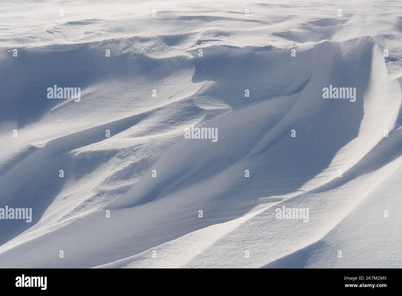 Snow drifts in the sunlight Stock Photo - Alamy