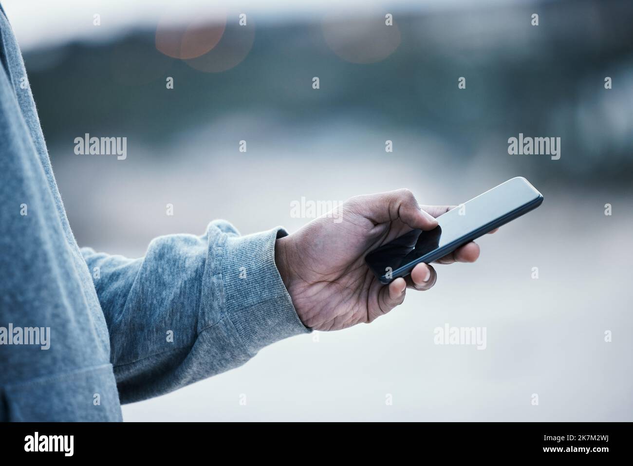 This app will be the next big thing. an unrecognizable man using his ...