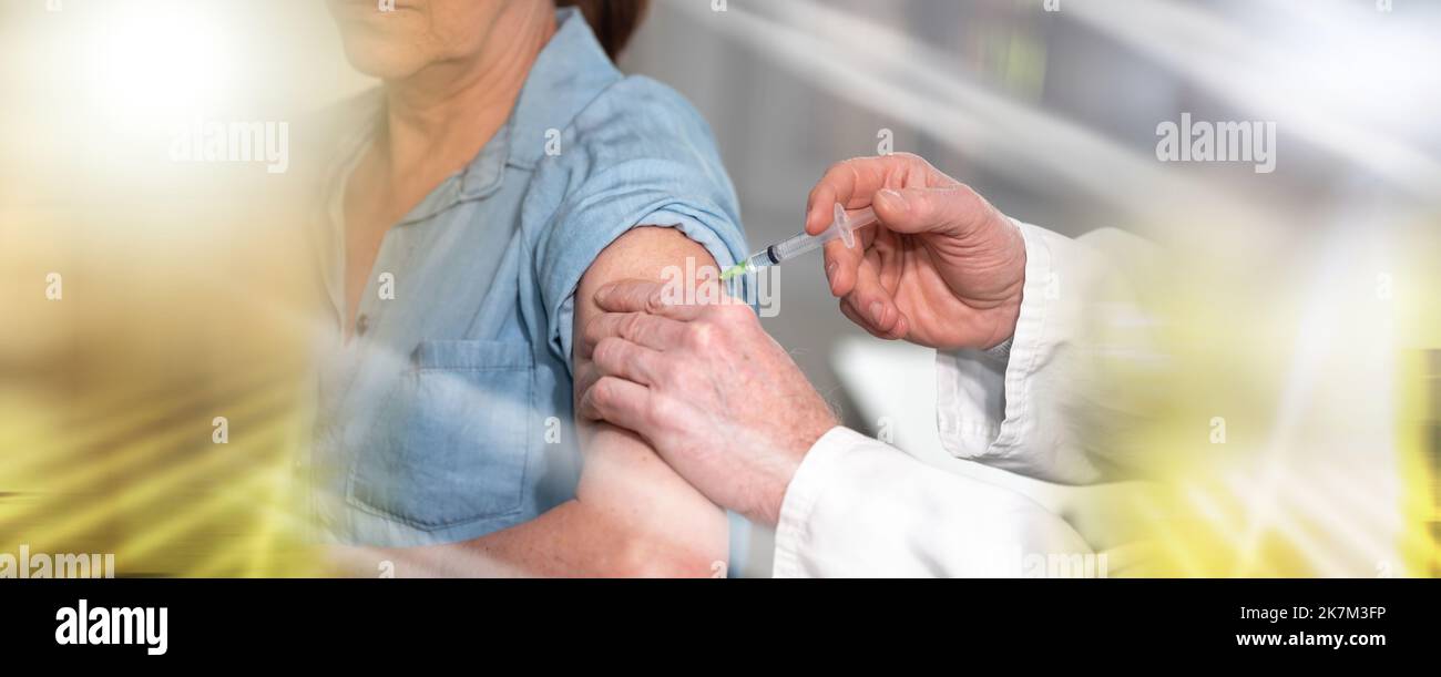 Doctor injecting vaccine to female patient; multiple exposure Stock ...